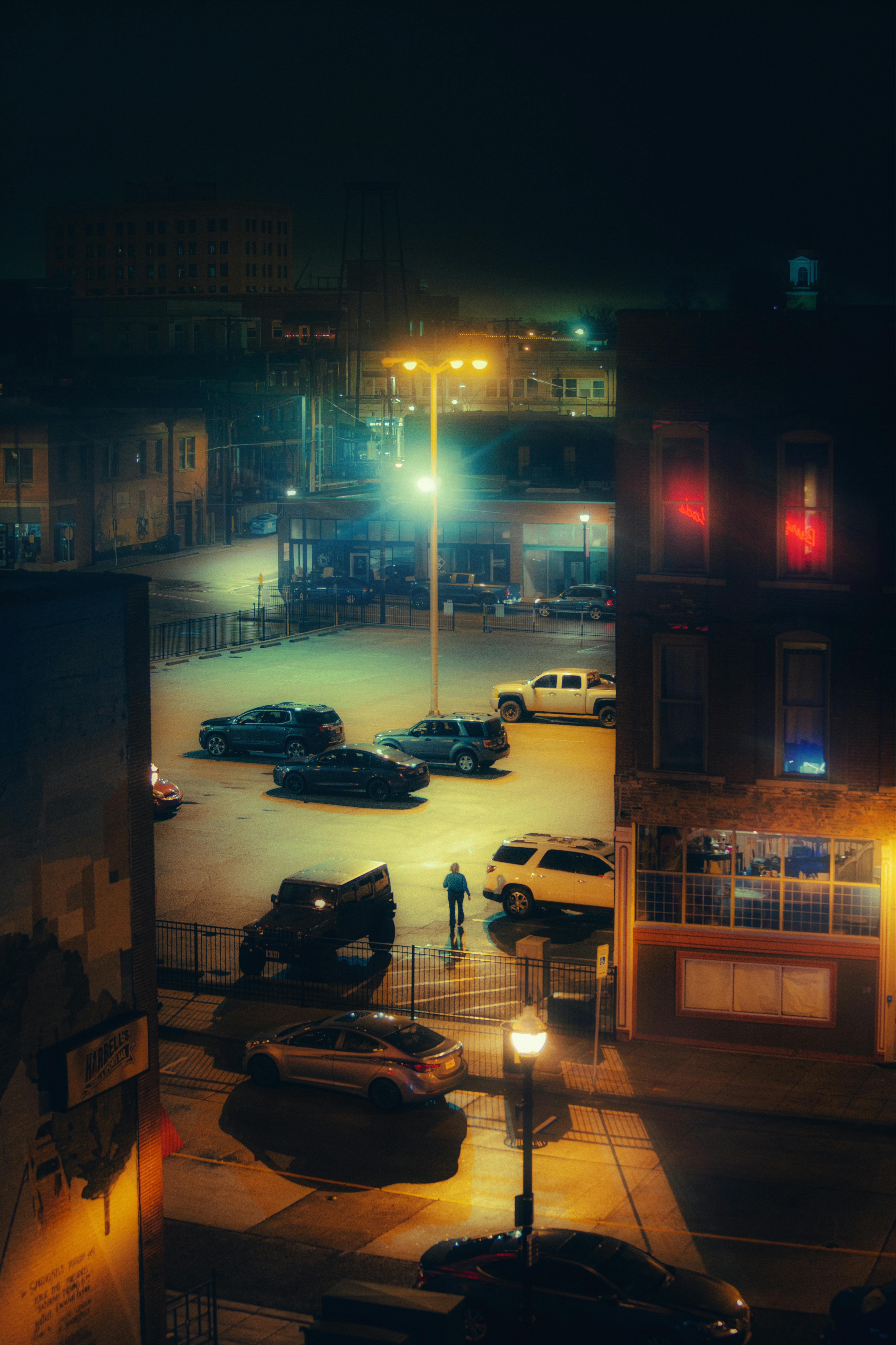 Man Wokrking Outdoors at Night · Free Stock Photo