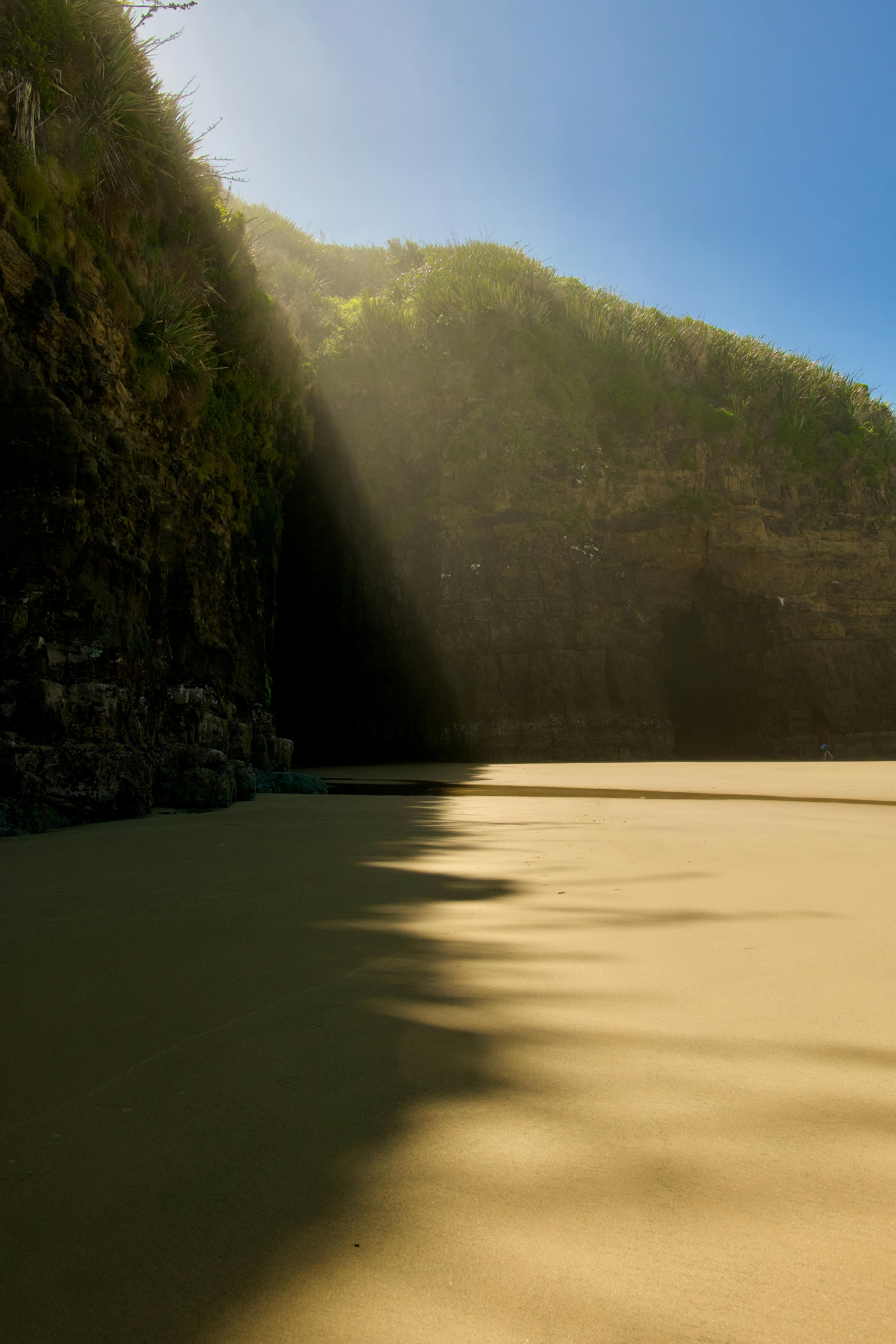 Shadowed Sandy Beach · Free Stock Photo
