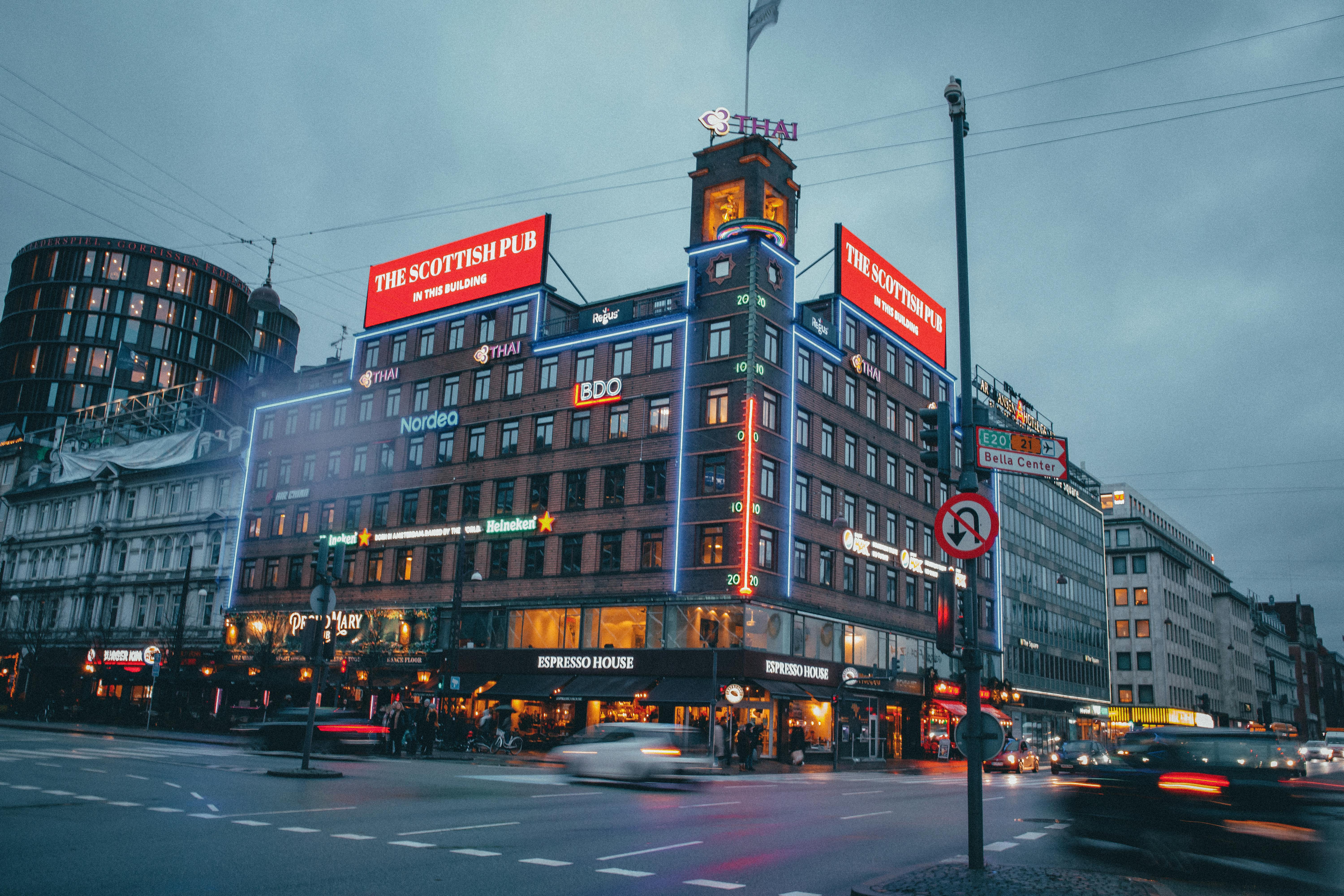 Illuminated Facade of Downtown Building · Free Stock Photo