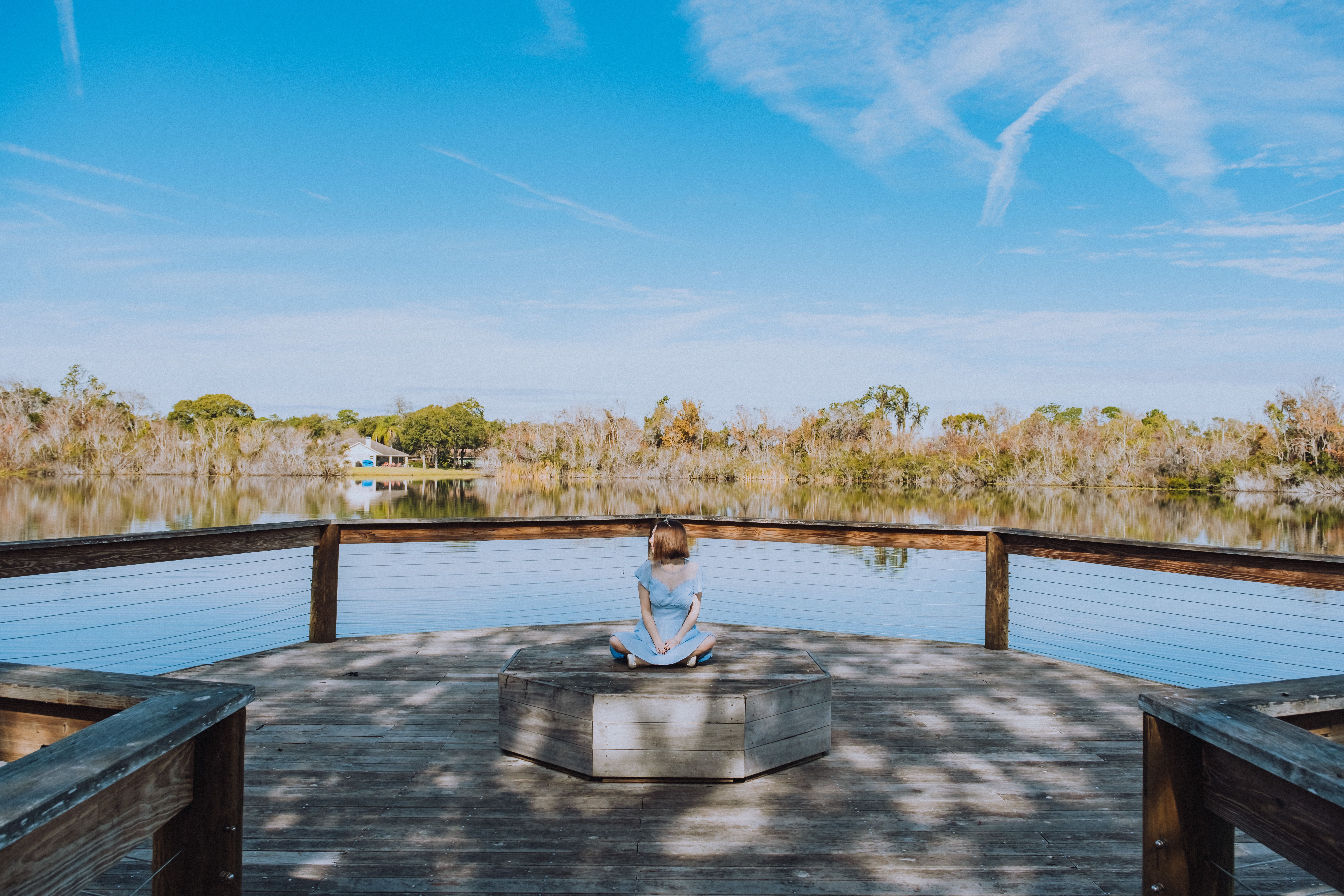 Tourist Relaxing on Pier · Free Stock Photo