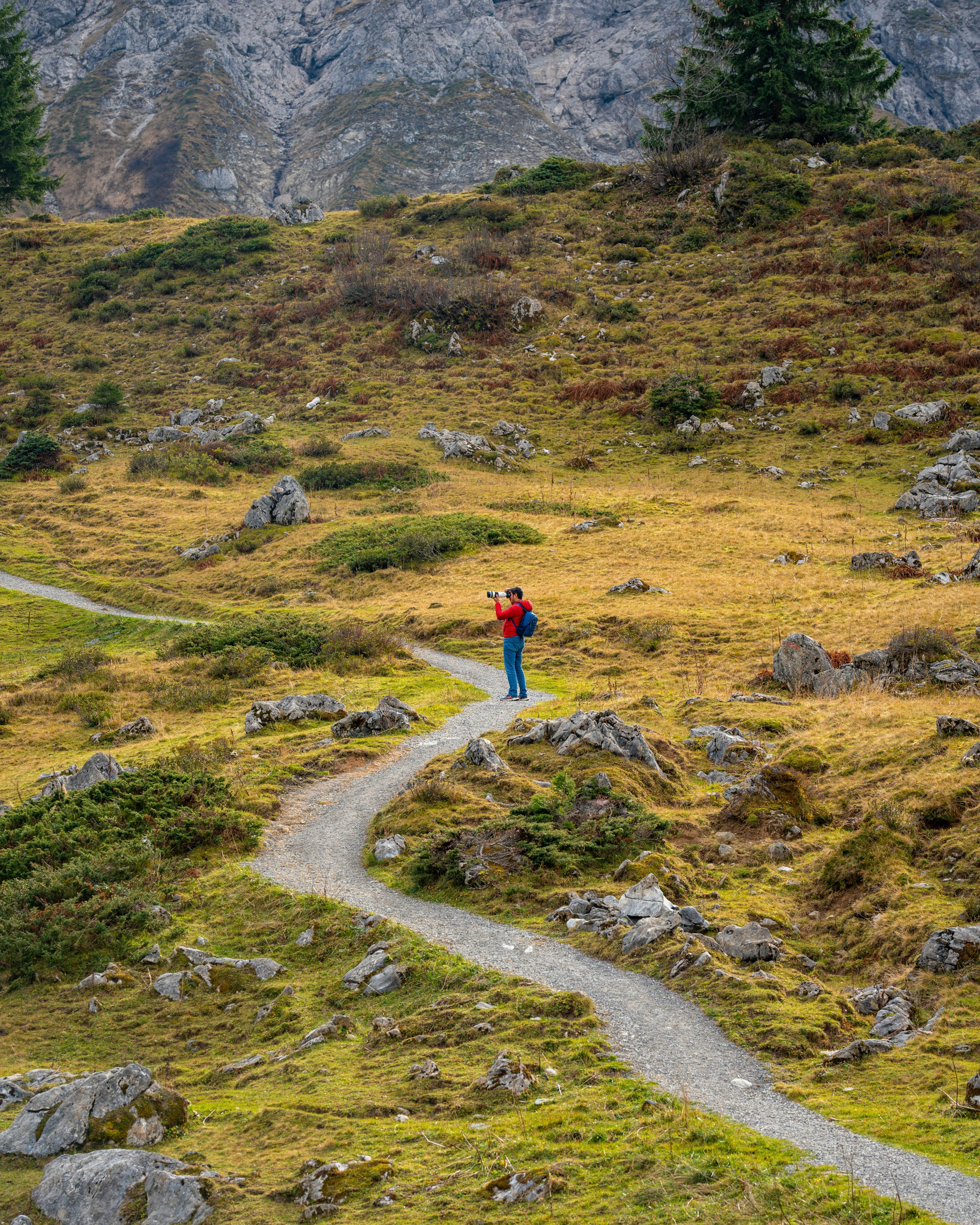 Person Standing on Footpath · Free Stock Photo
