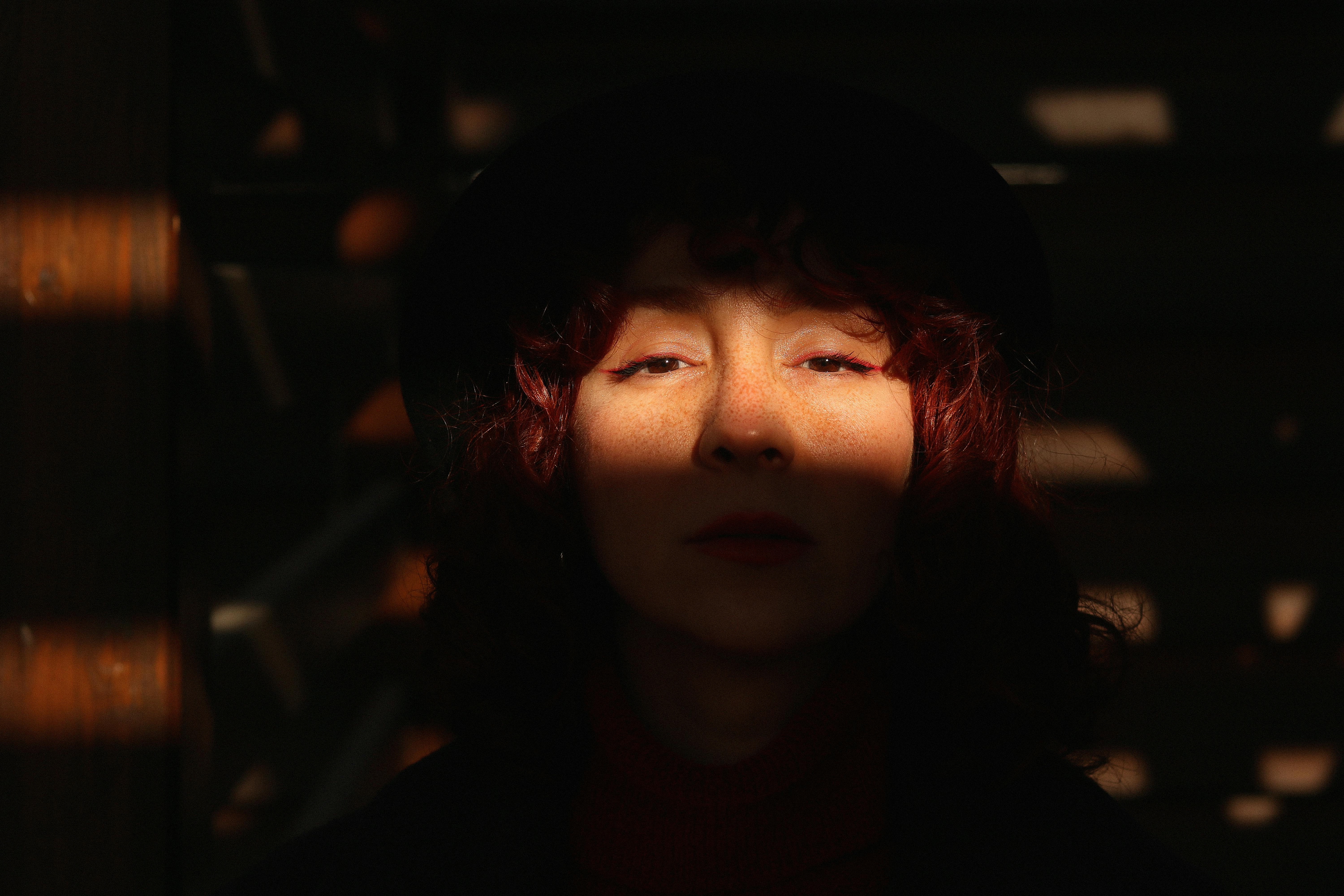 Woman Face in Sunlight and Shadow · Free Stock Photo