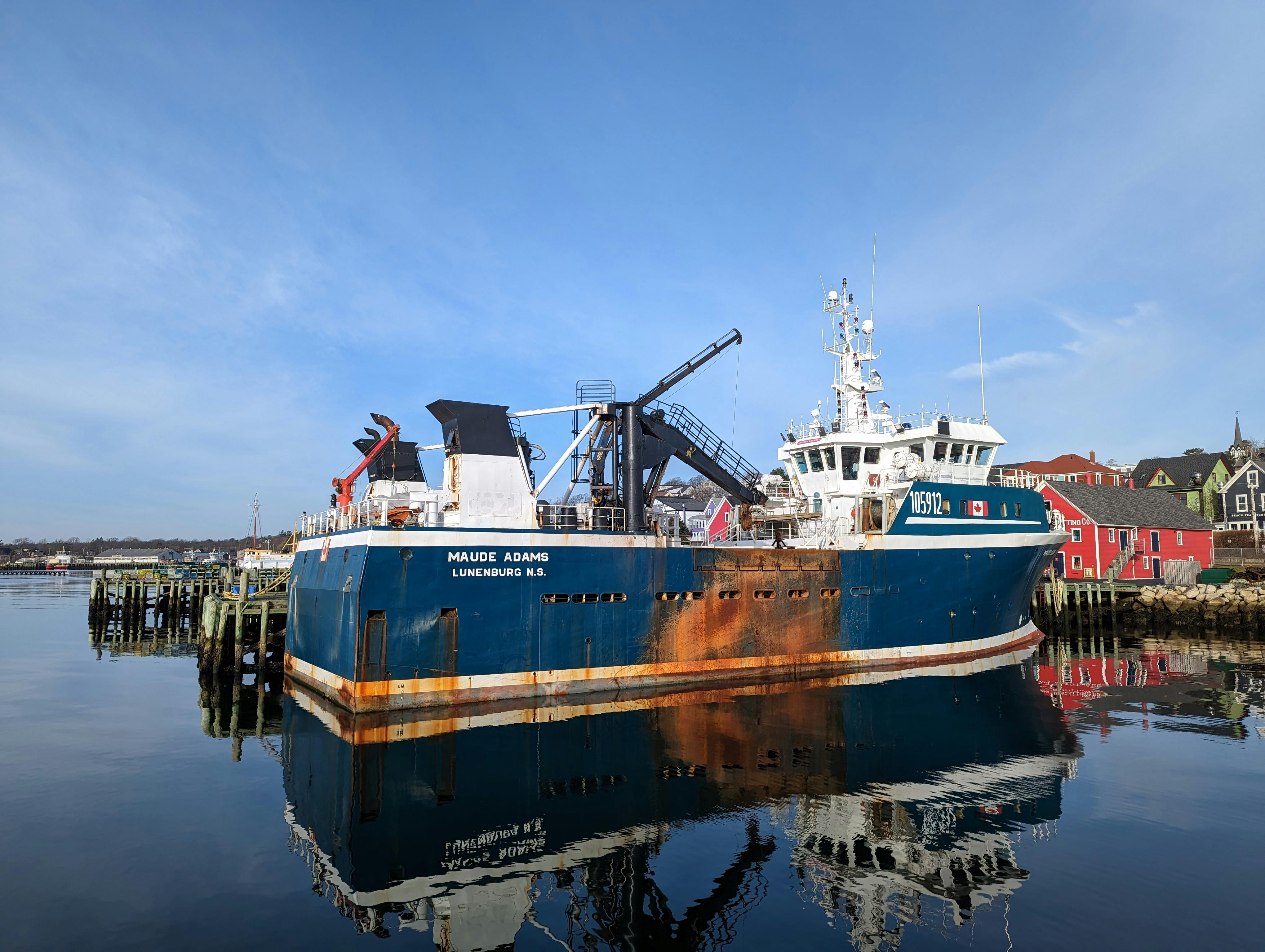 Trawler Moored in Canadian Town Harbor · Free Stock Photo