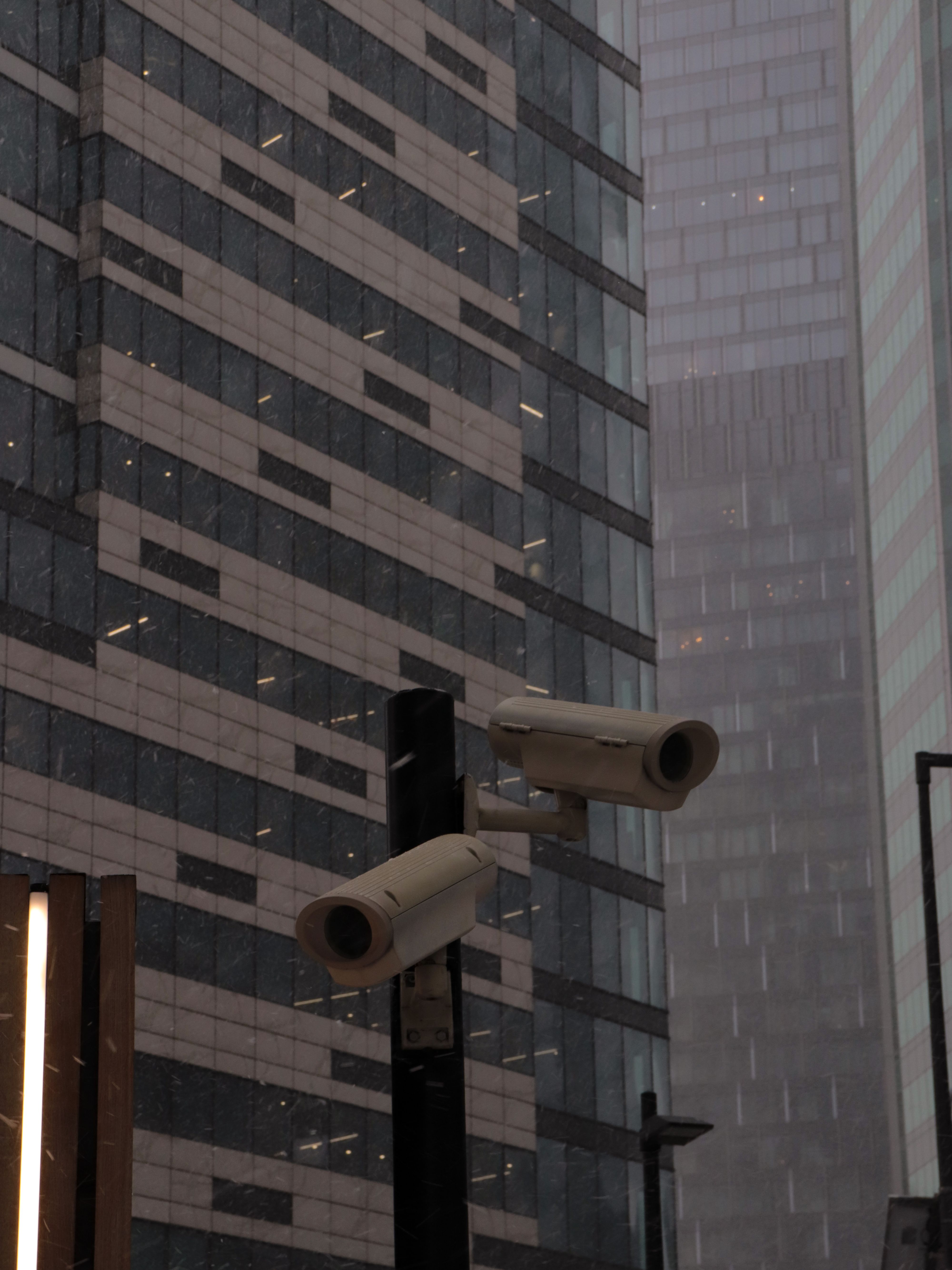 CCTV Camera On A Post Outside A Building · Free Stock Photo