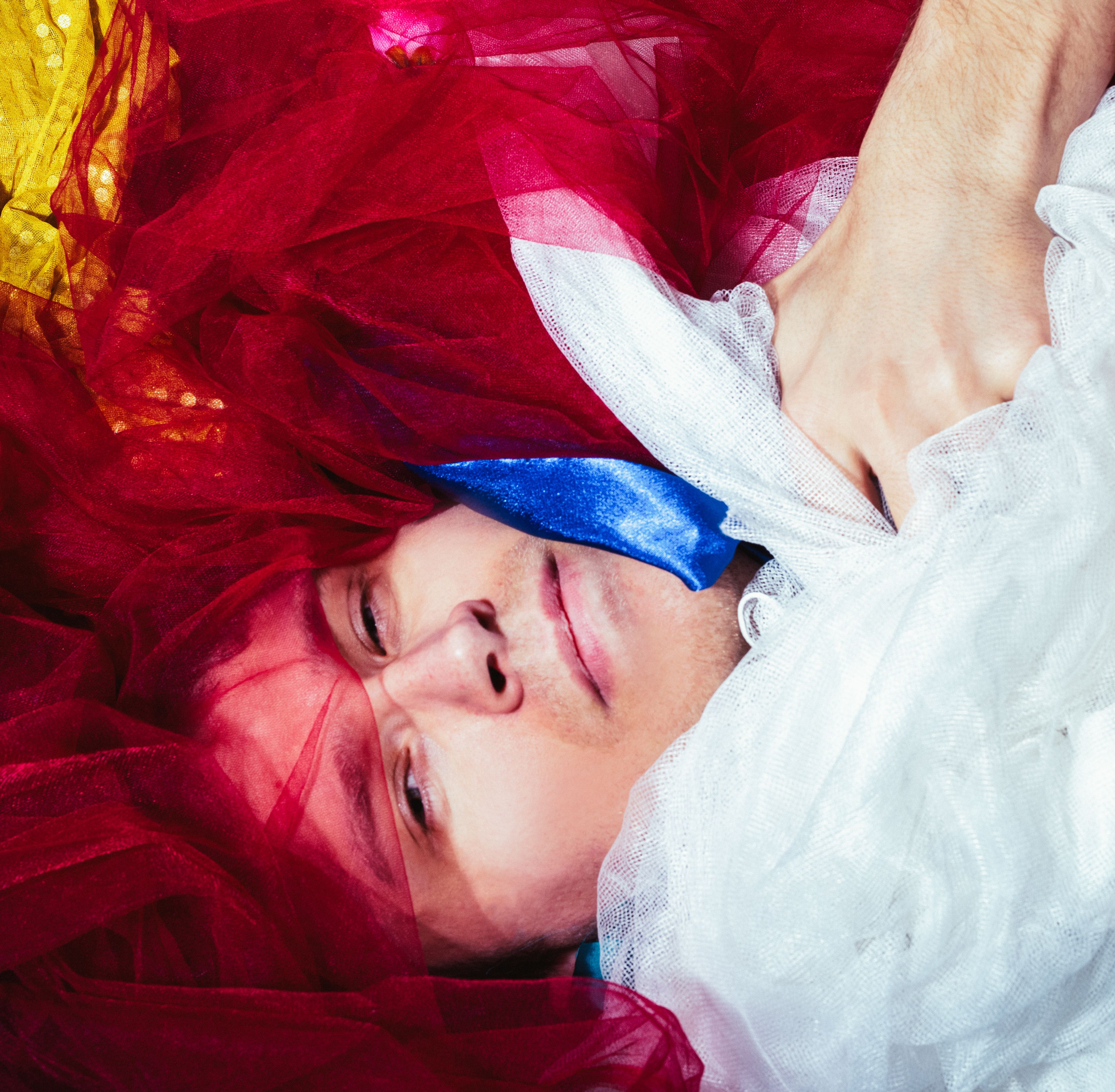 Person Covering Face with a Red Cloth · Free Stock Photo