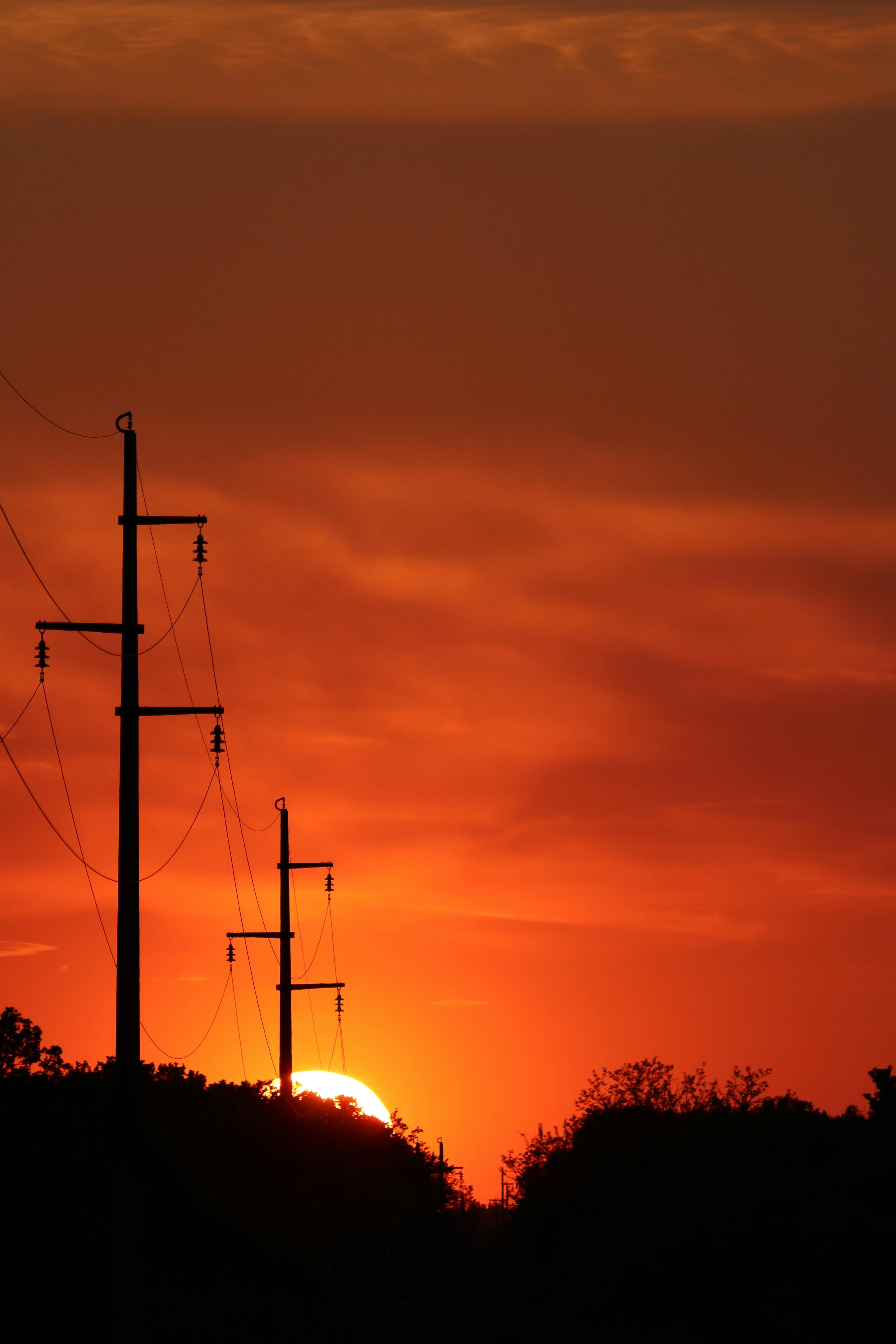 Sunset over power lines · Free Stock Photo