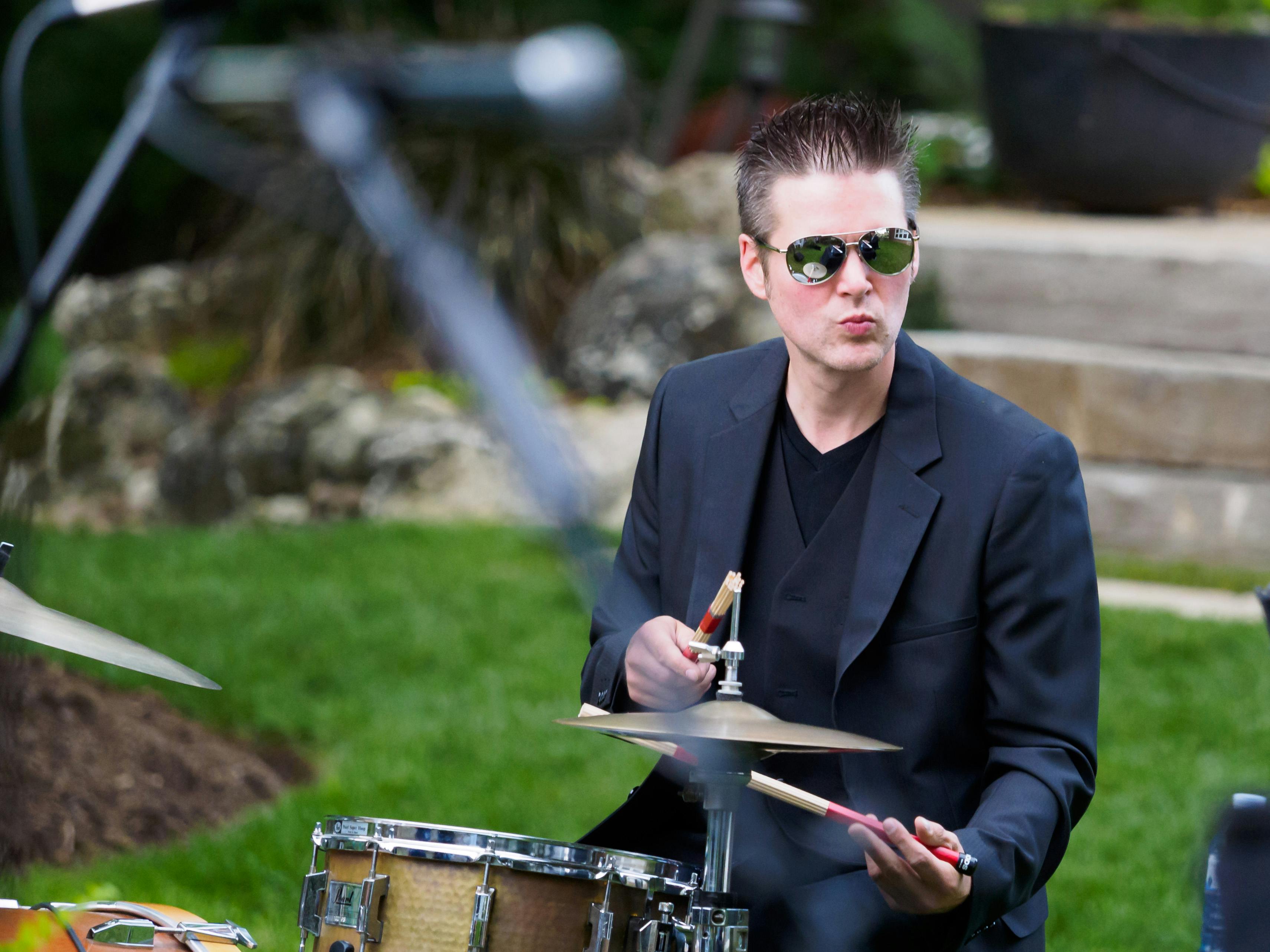 A Drummer Wearing a Blazer · Free Stock Photo