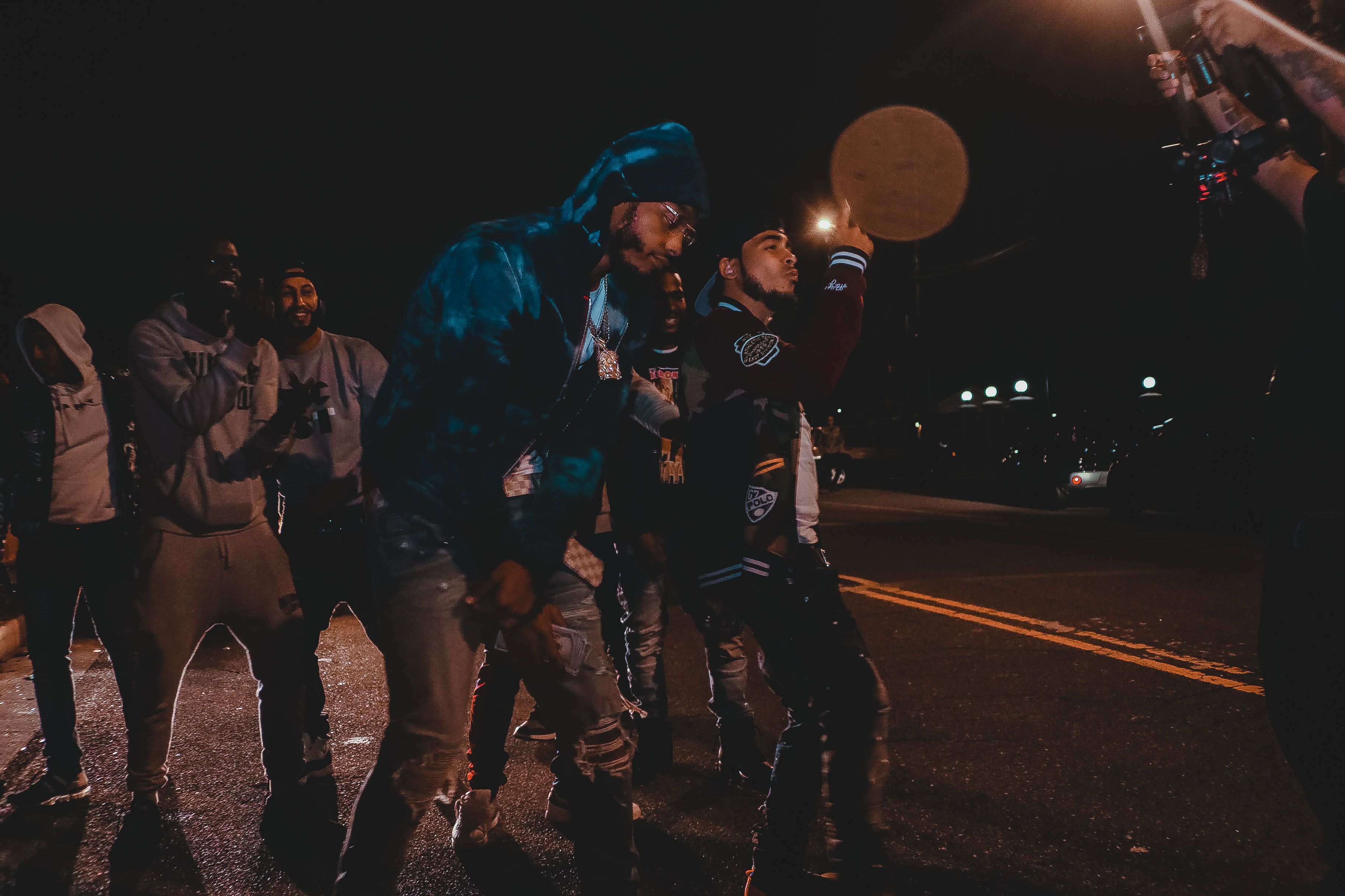 Men Standing On Road During Nighttime · Free Stock Photo