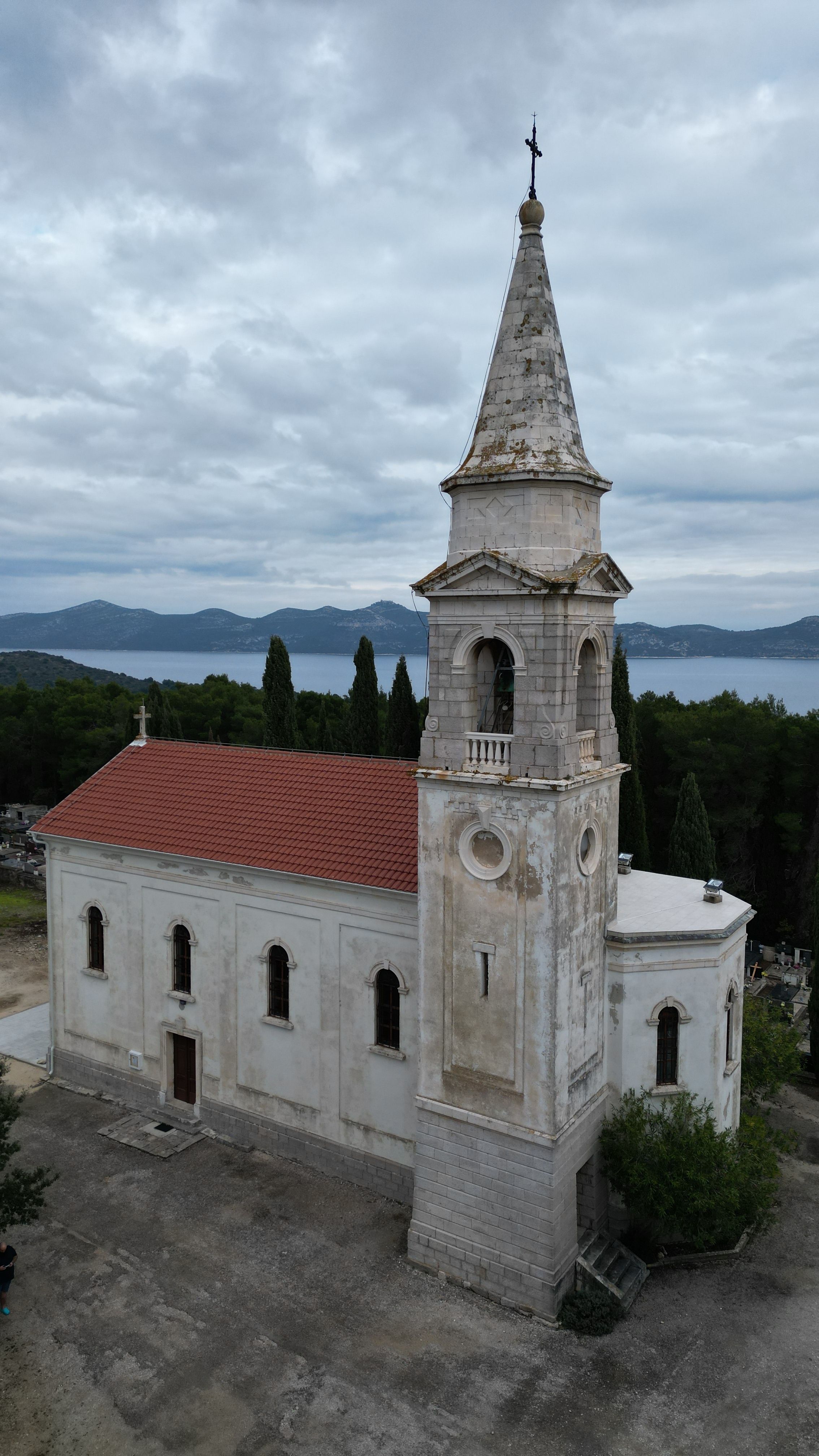 An Old Church between Trees · Free Stock Photo