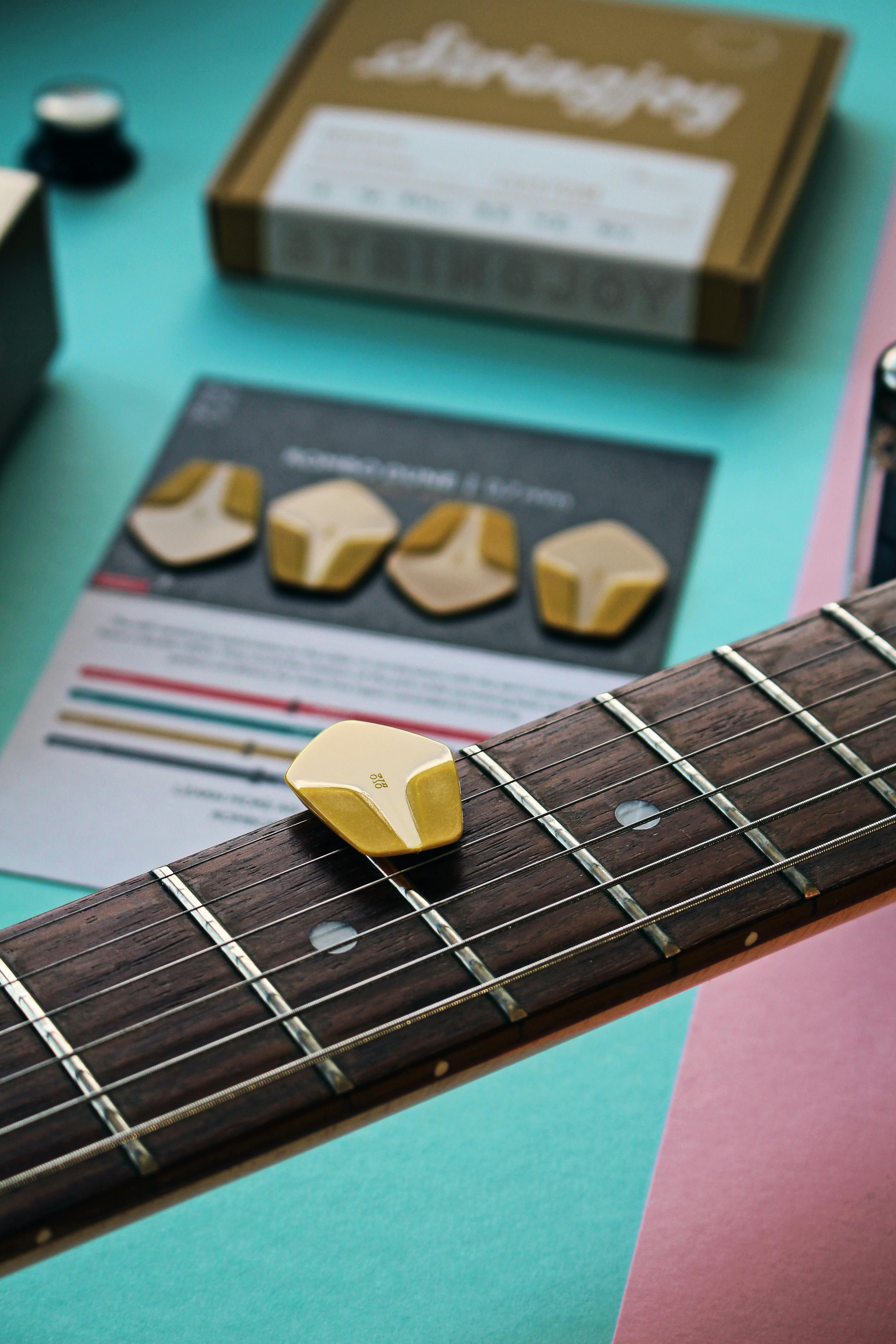 Guitar Fretboard and Guitar Picks · Free Stock Photo