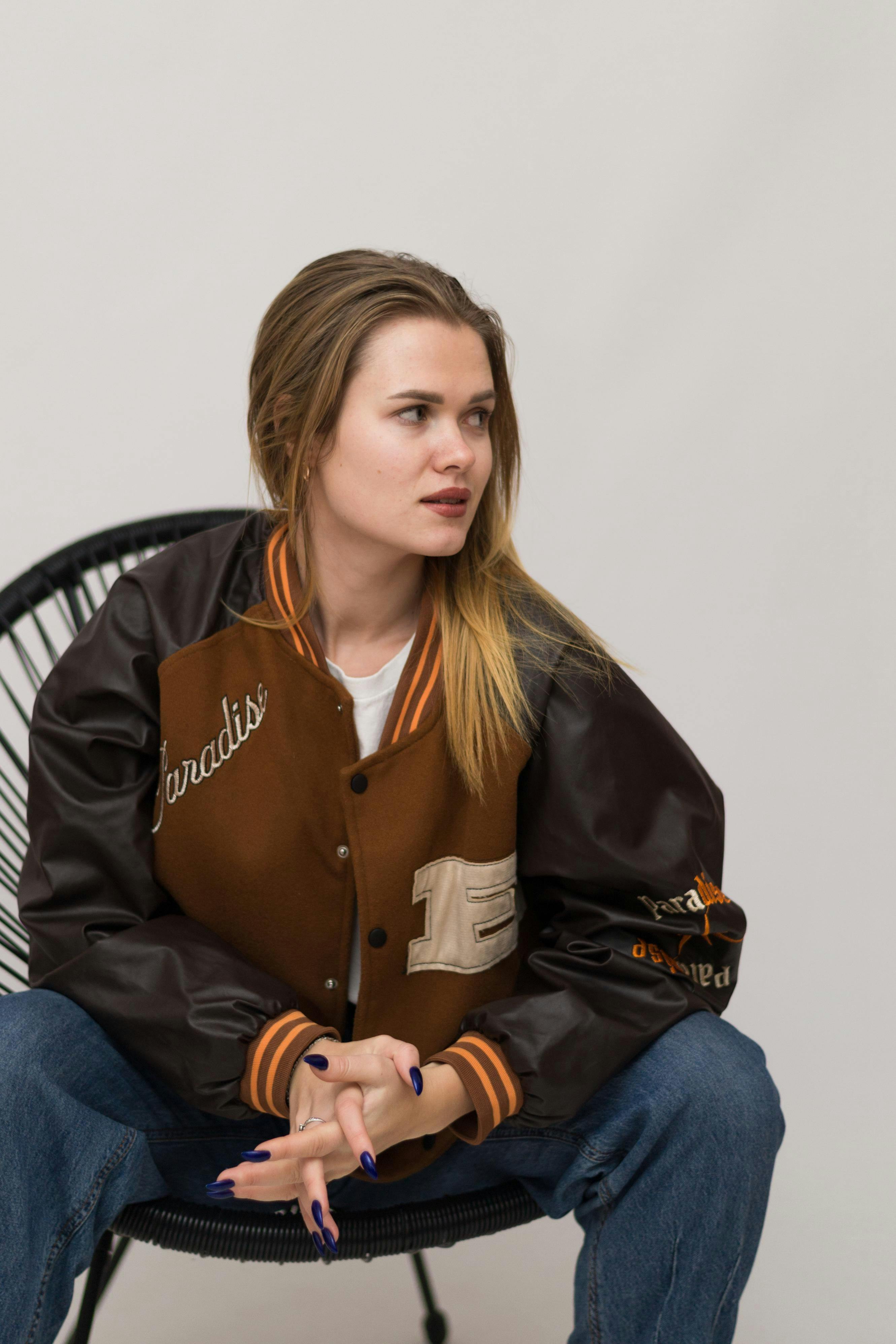 Beautiful Woman Tying her Leather Jacket Belt · Free Stock Photo