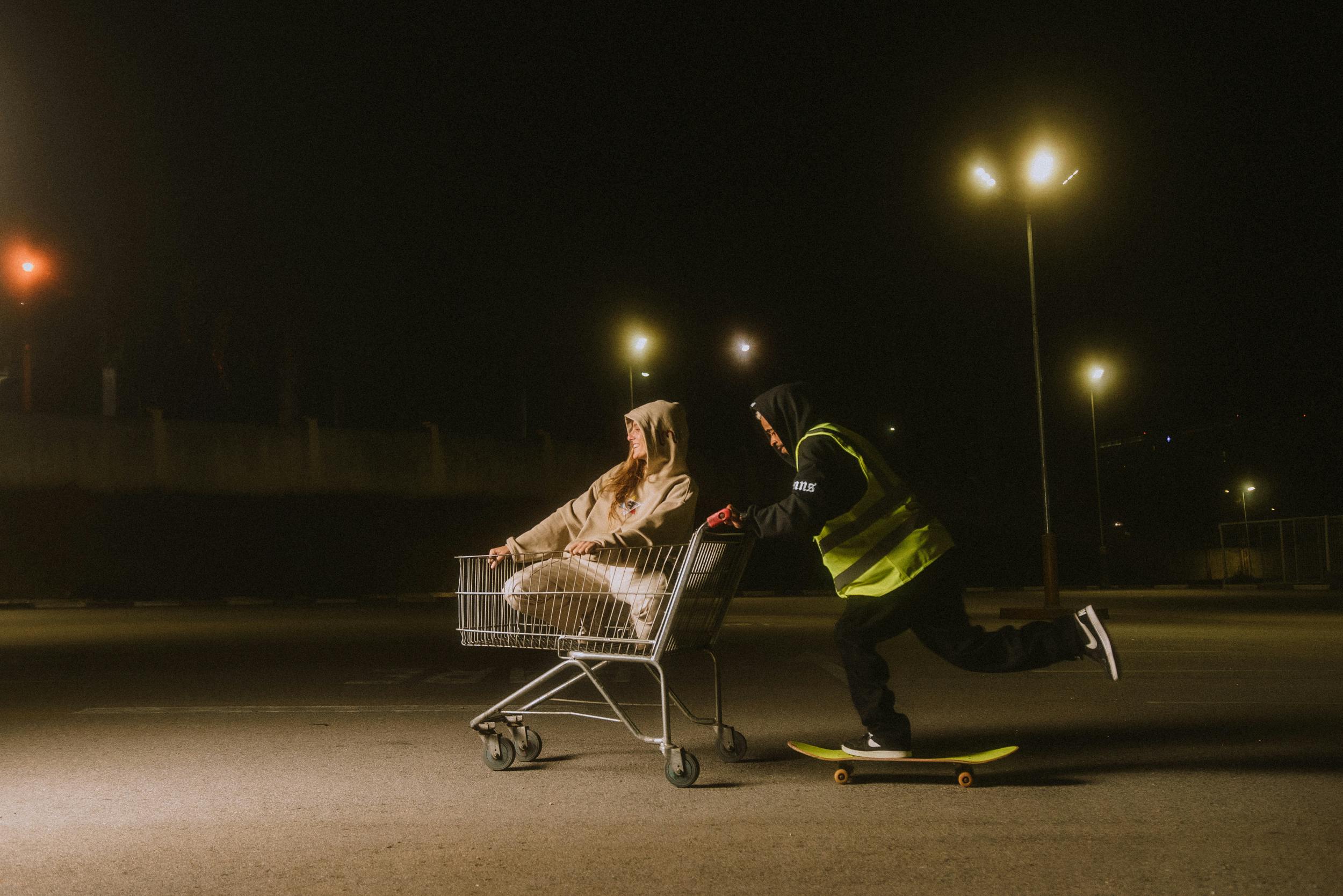 A Homeless Man Pushing Shopping Cart · Free Stock Photo