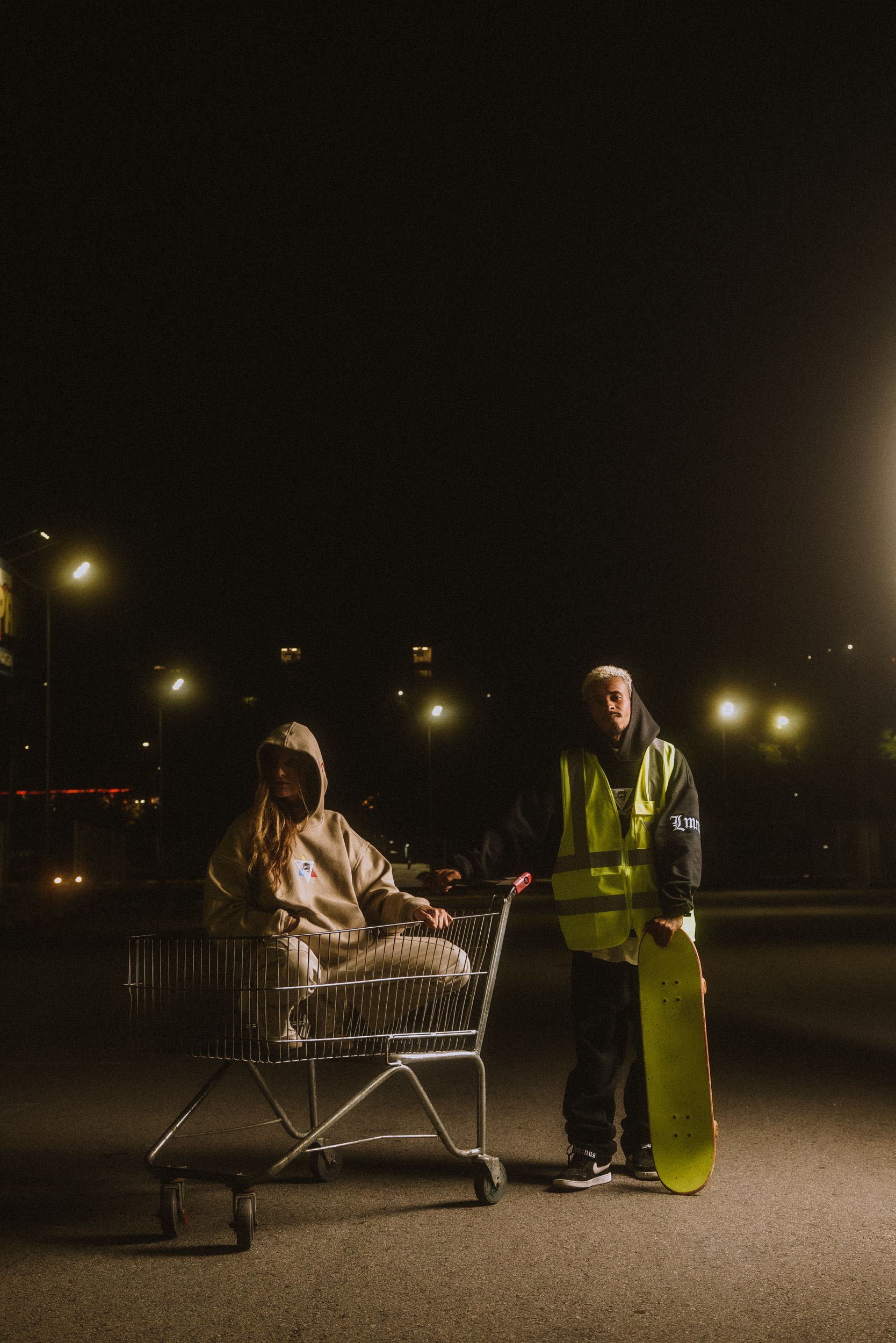 A man and woman in a cart at night · Free Stock Photo
