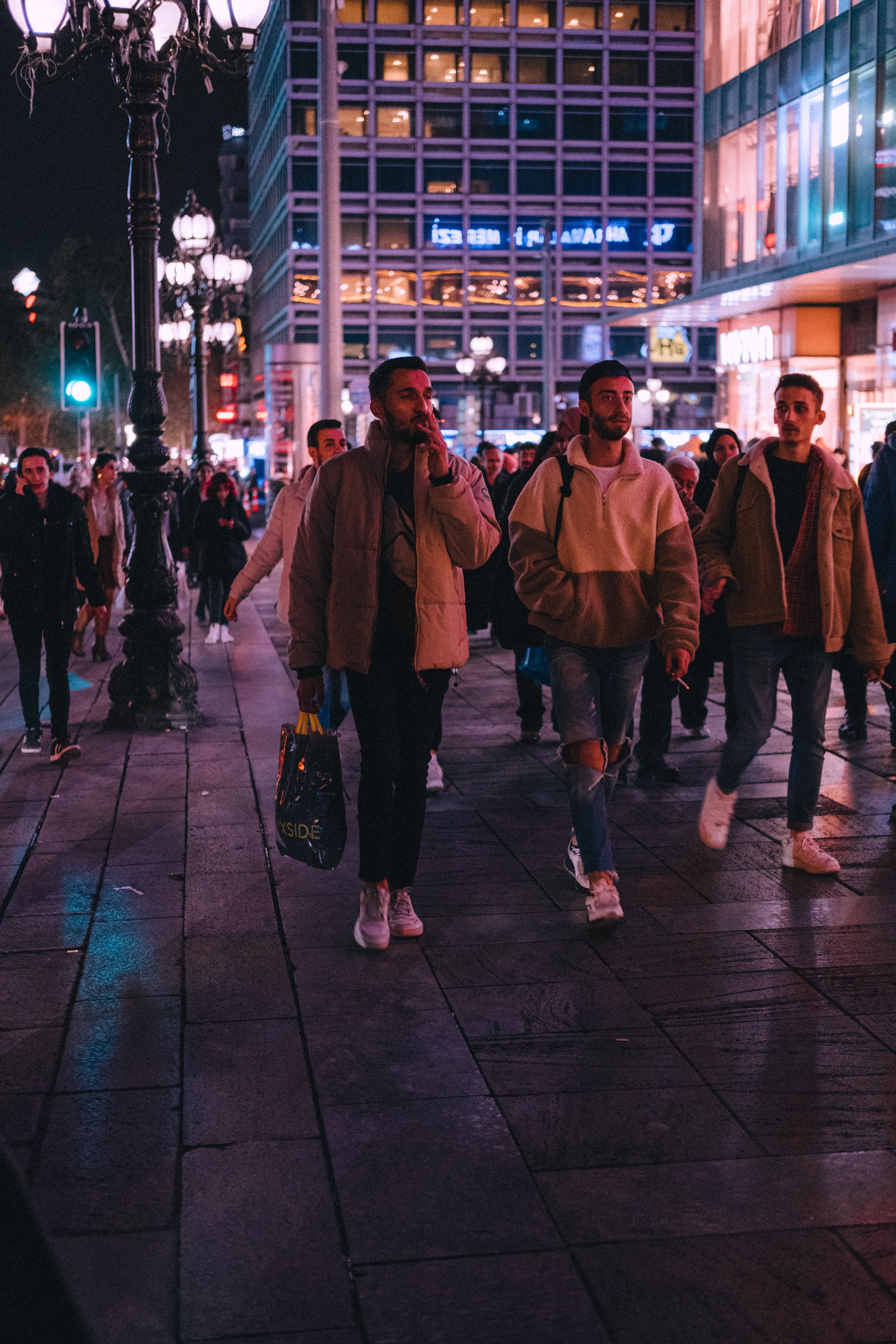 Men Walking in City at Night · Free Stock Photo
