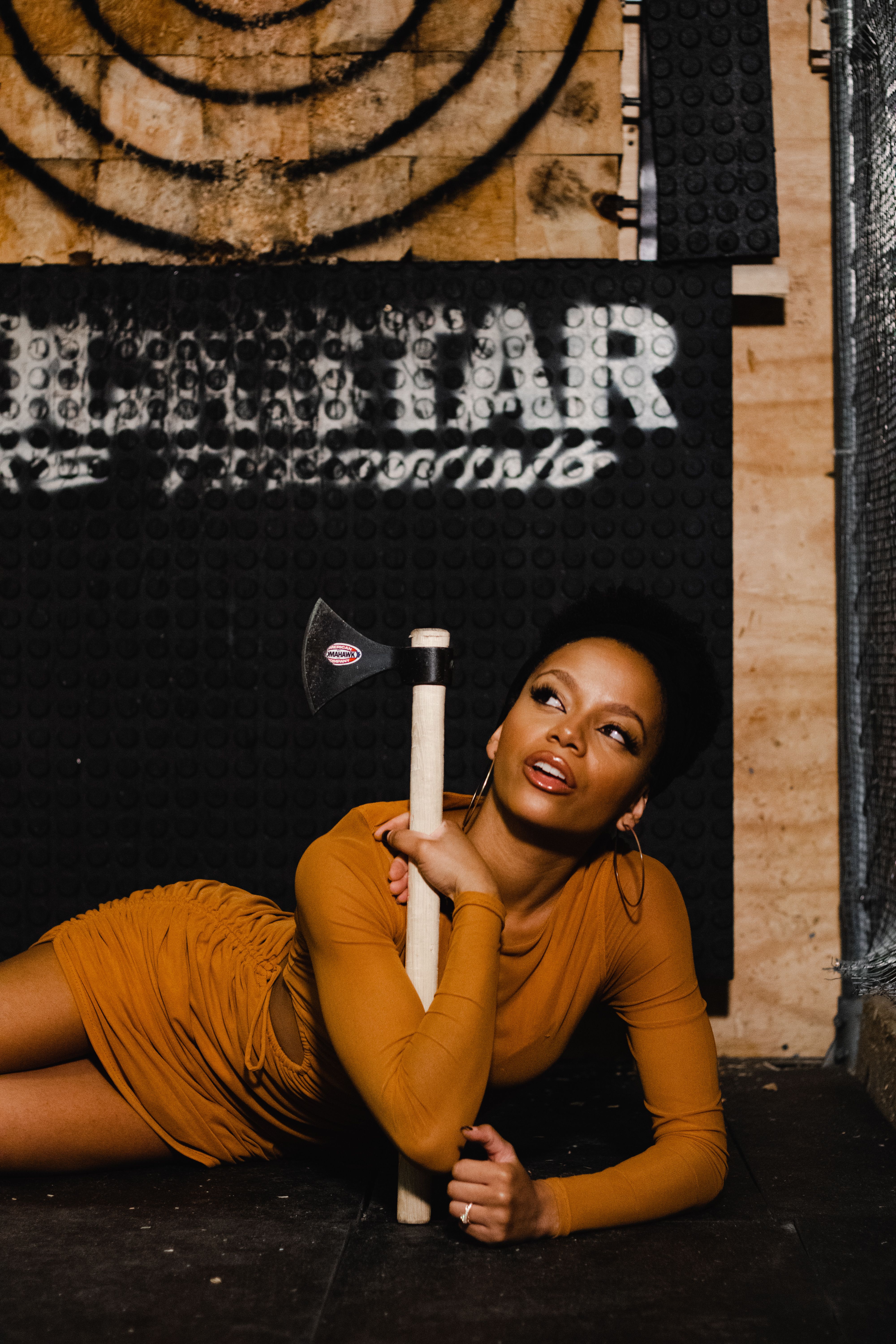 Woman in a Dress Holding an Axe · Free Stock Photo