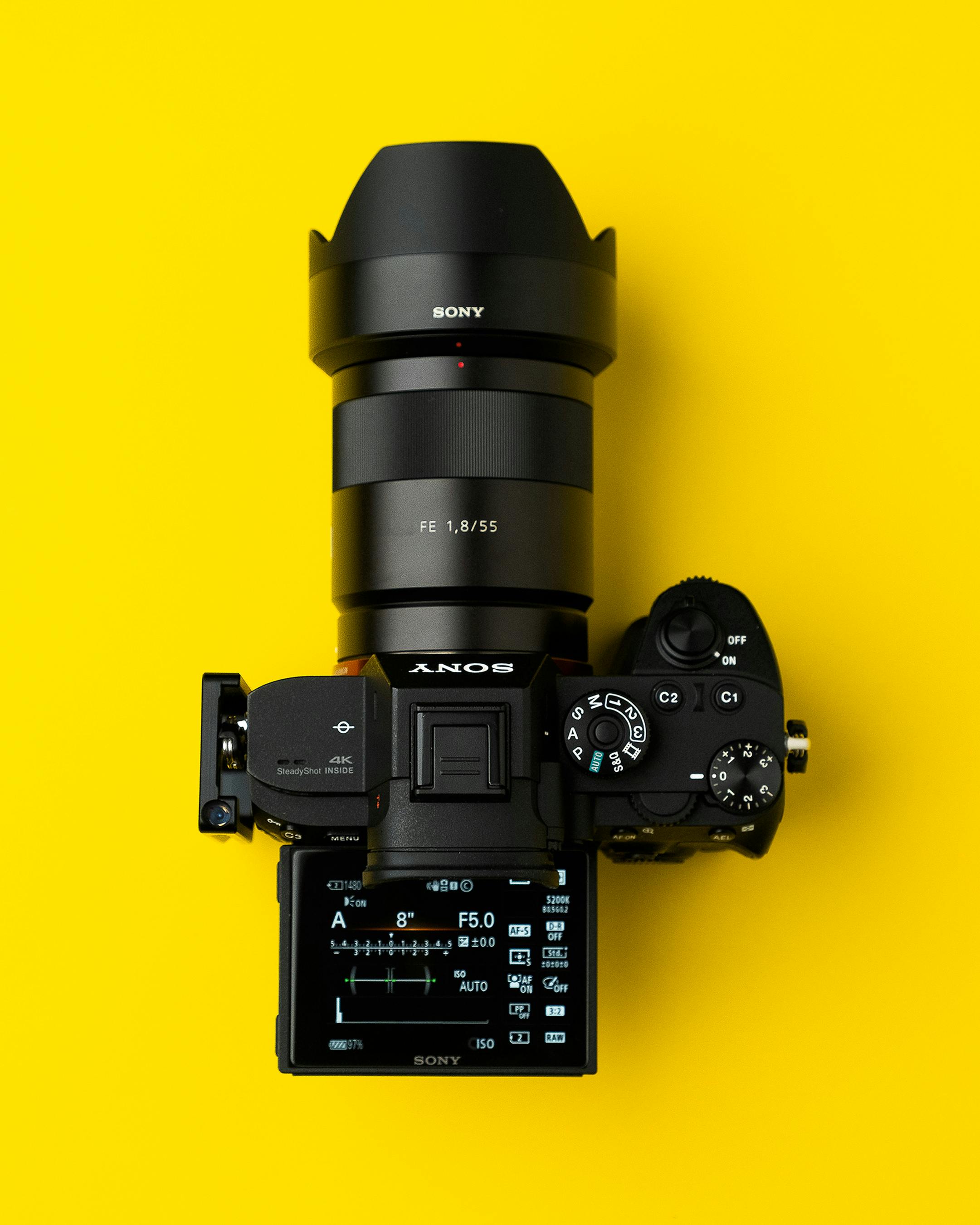 Photo of a Black Digital Camera with a LCD Screen Opened · Free Stock Photo