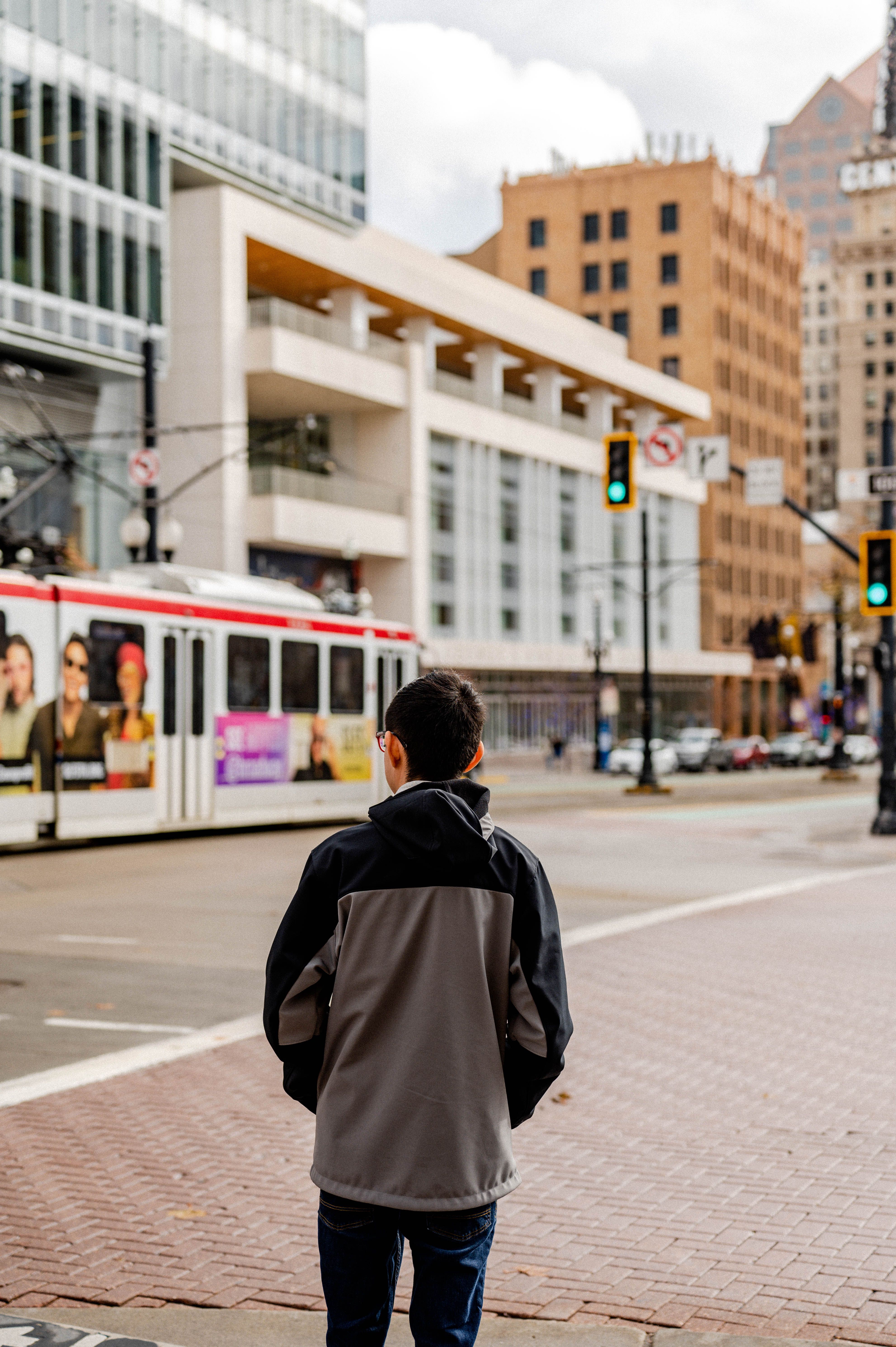 Back View of a Boy in City · Free Stock Photo