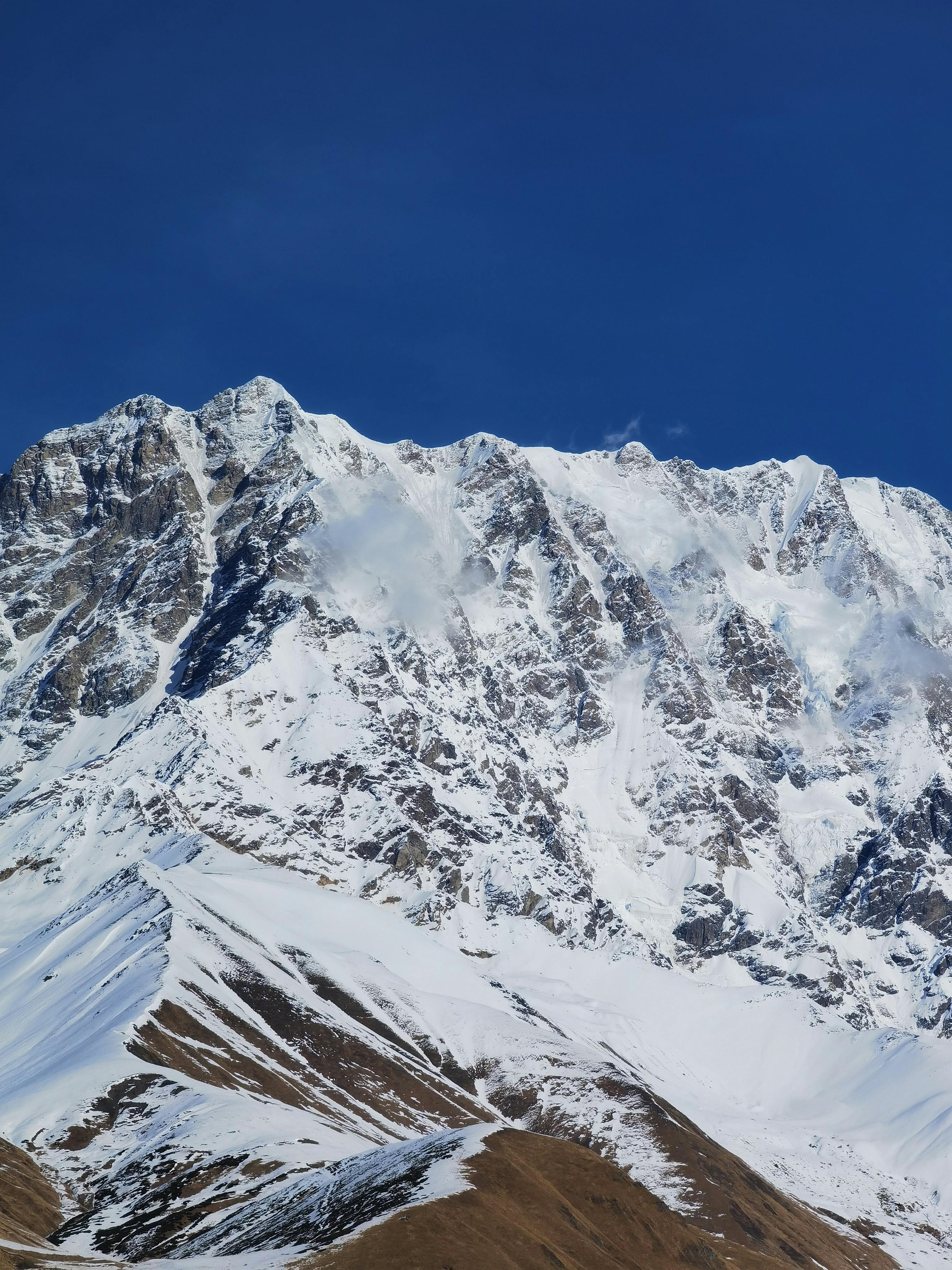 Snow Covered Mountain Under the Blue Sky · Free Stock Photo