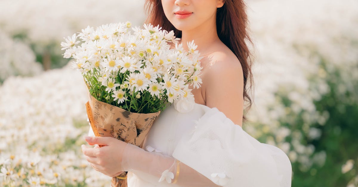 Beautiful Woman In White Dress Holding Bouquet Of Flowers · Free Stock