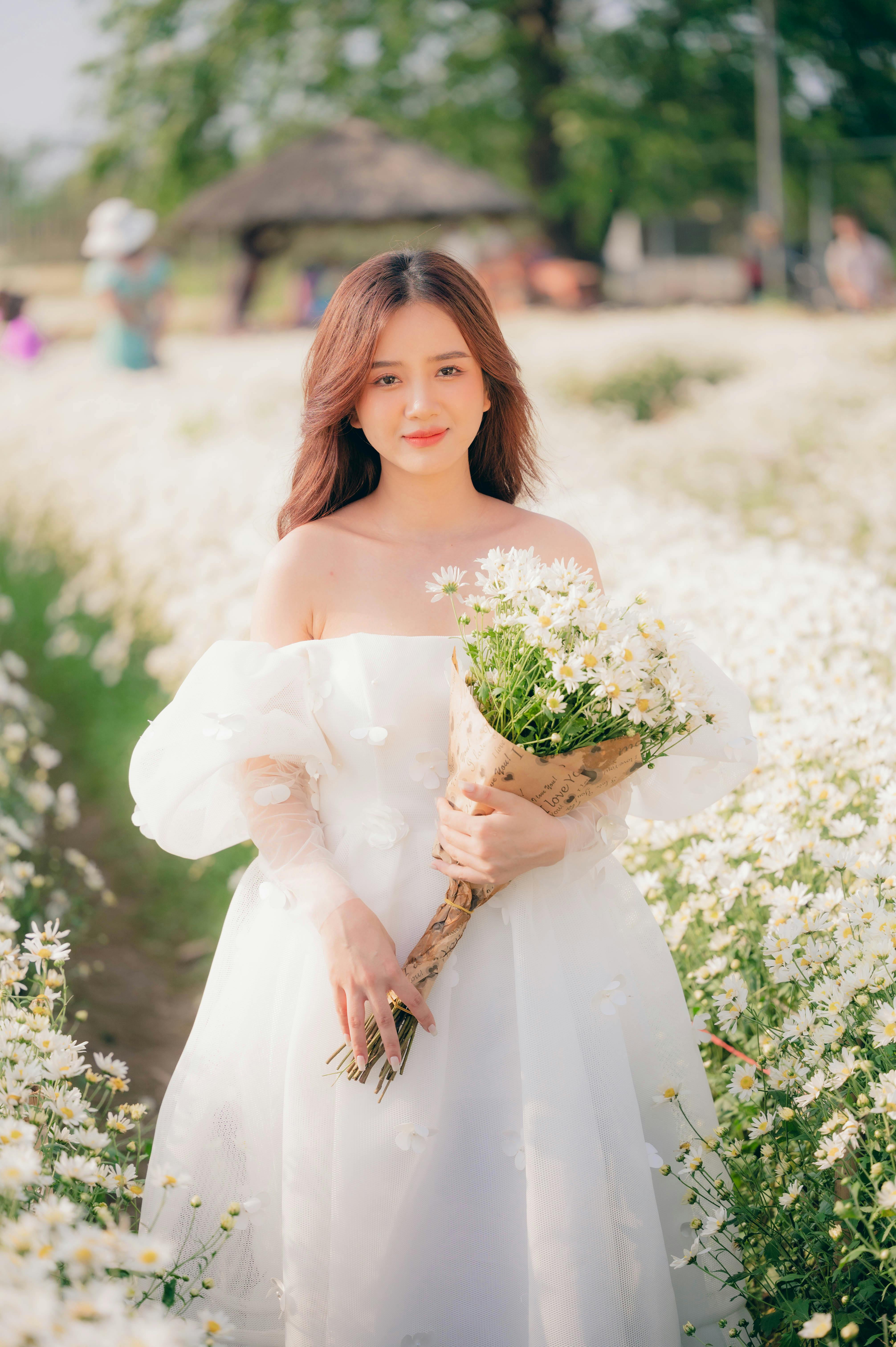 A Woman in Her Wedding Dress · Free Stock Photo