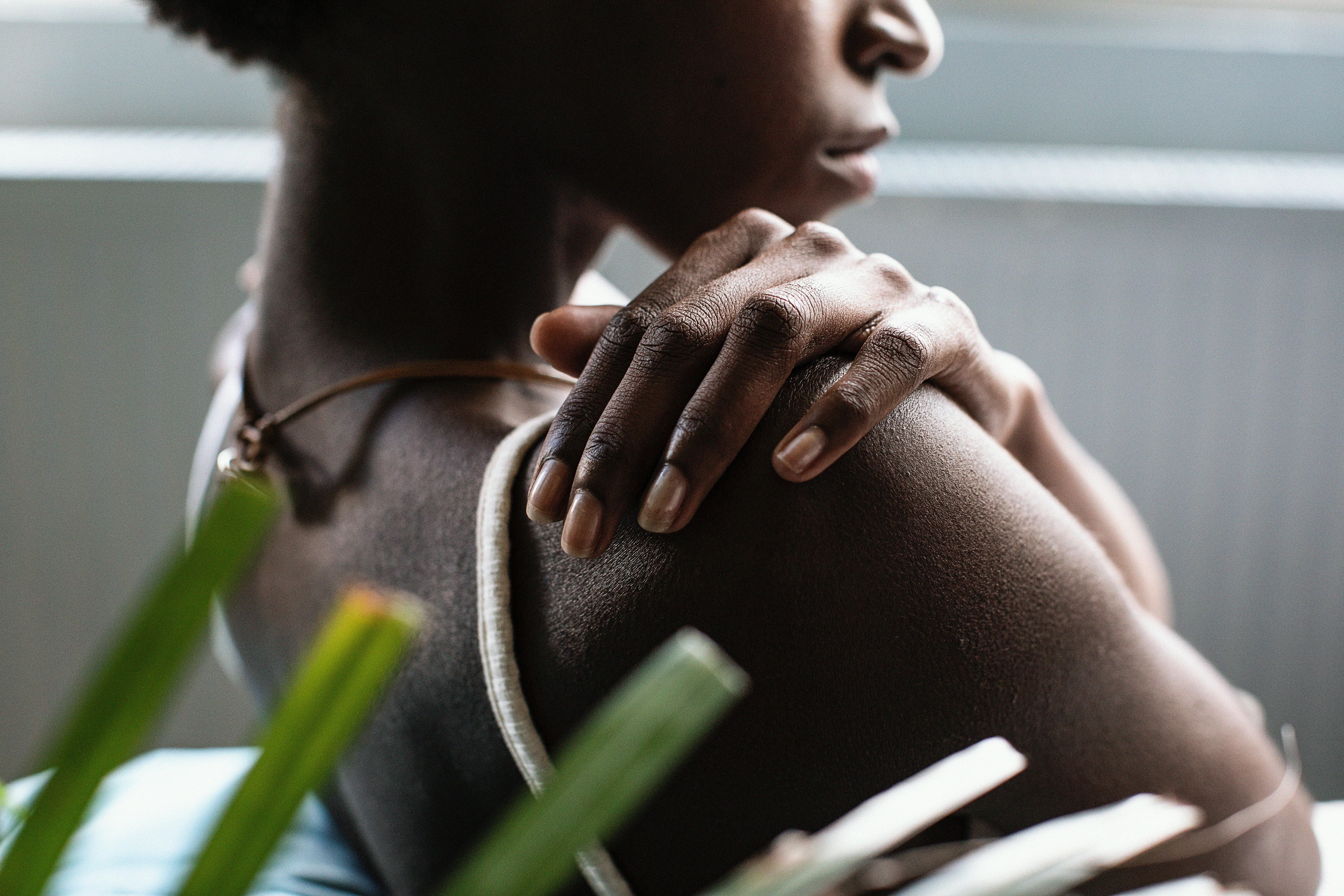 Woman Touching Shoulder · Free Stock Photo