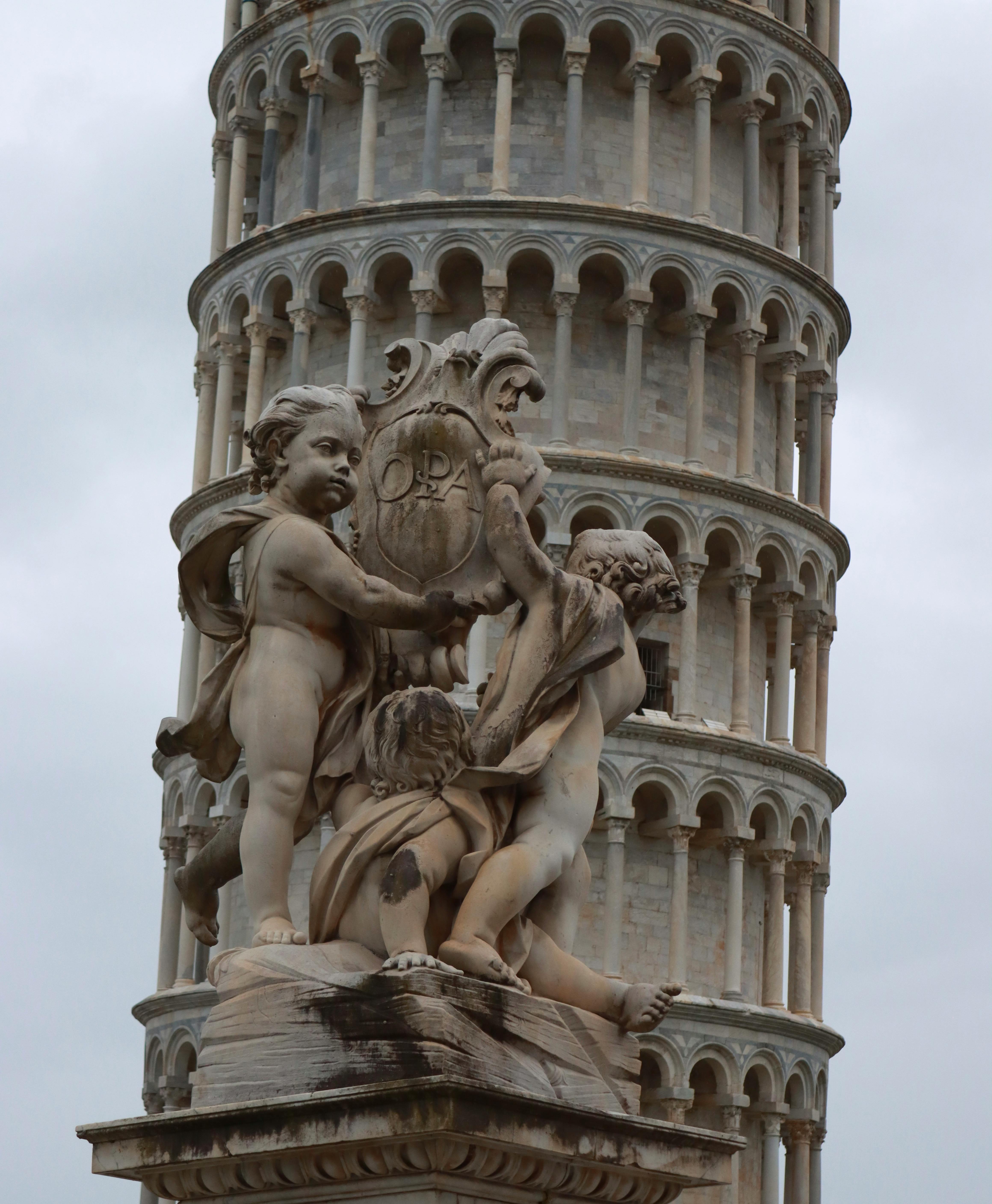 Sculpture in front of the Leaning Tower of Pisa, Italy · Free Stock Photo