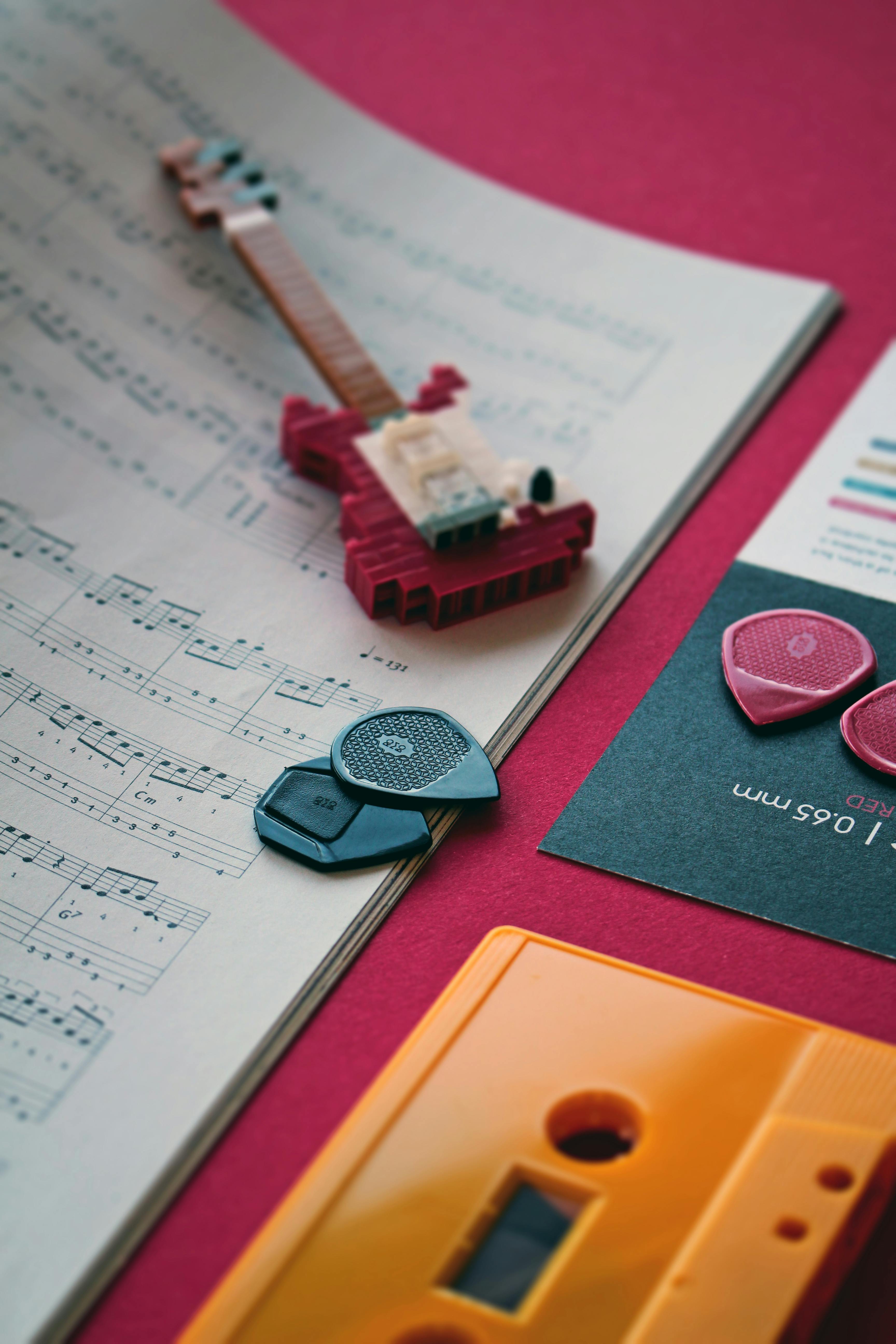 Design Guitar Picks by Casette and Music Notes · Free Stock Photo