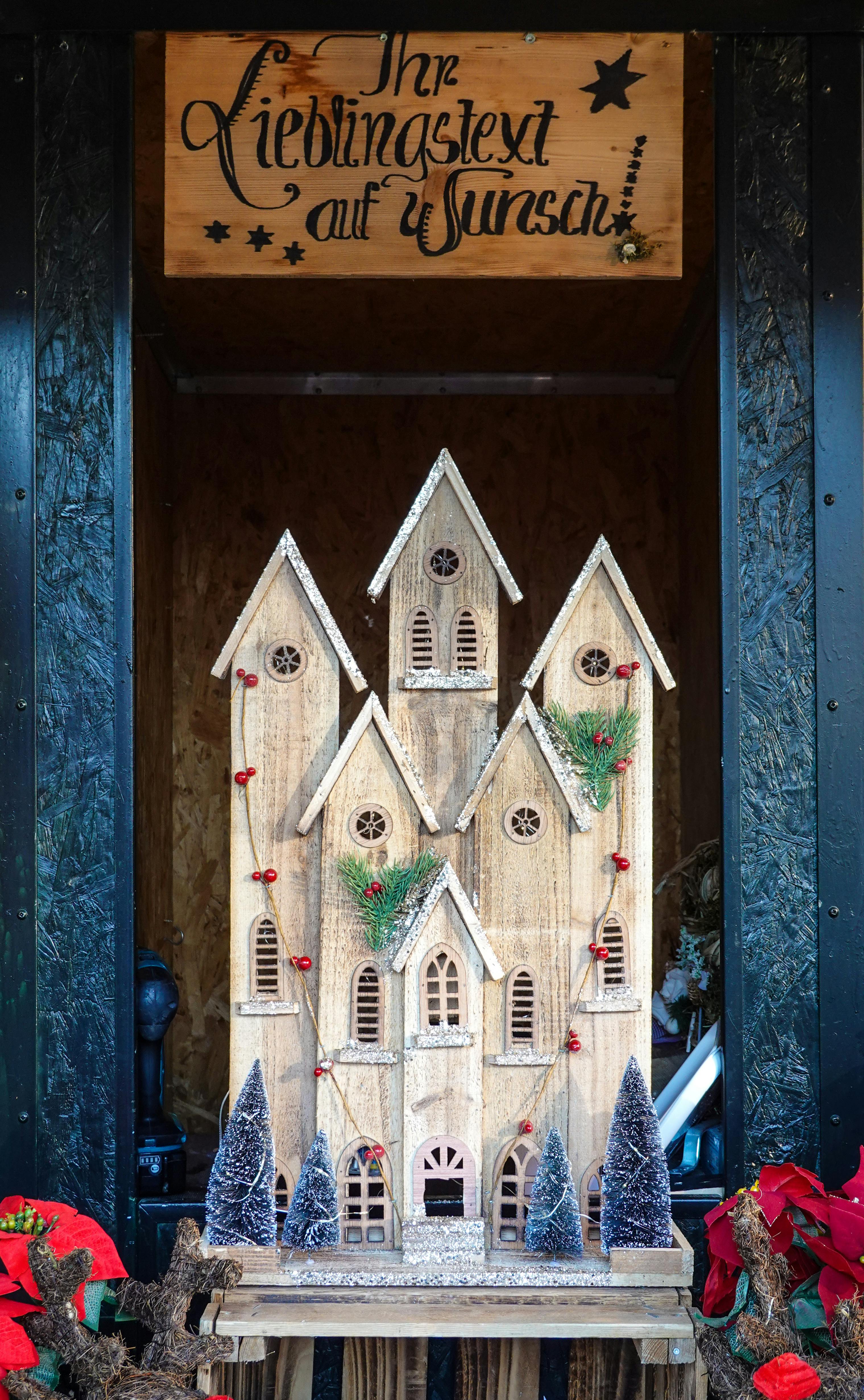 A Wooden Handcraft Near a Wall · Free Stock Photo