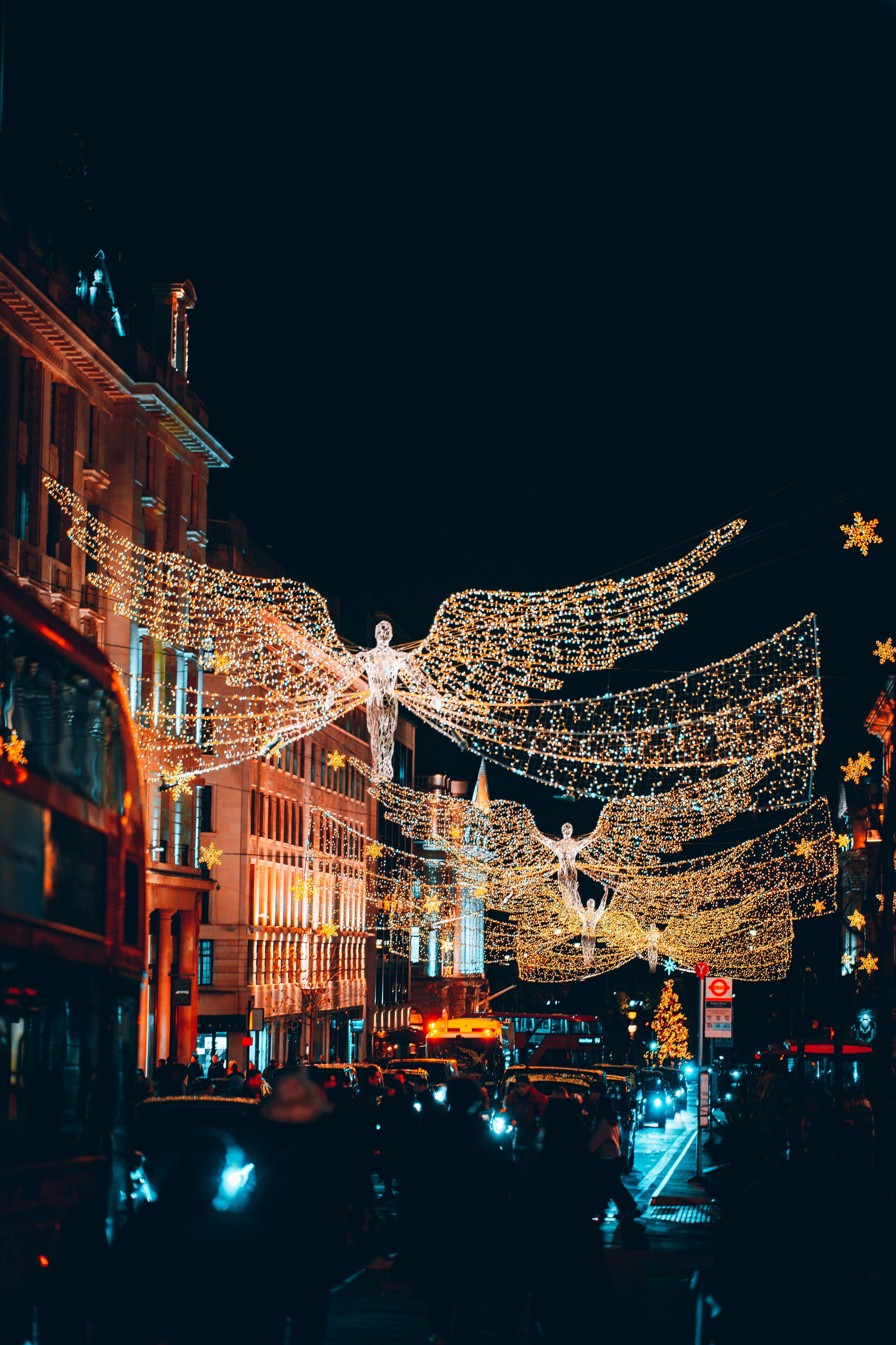 Angel Shaped Street Decorations in City at Night · Free Stock Photo