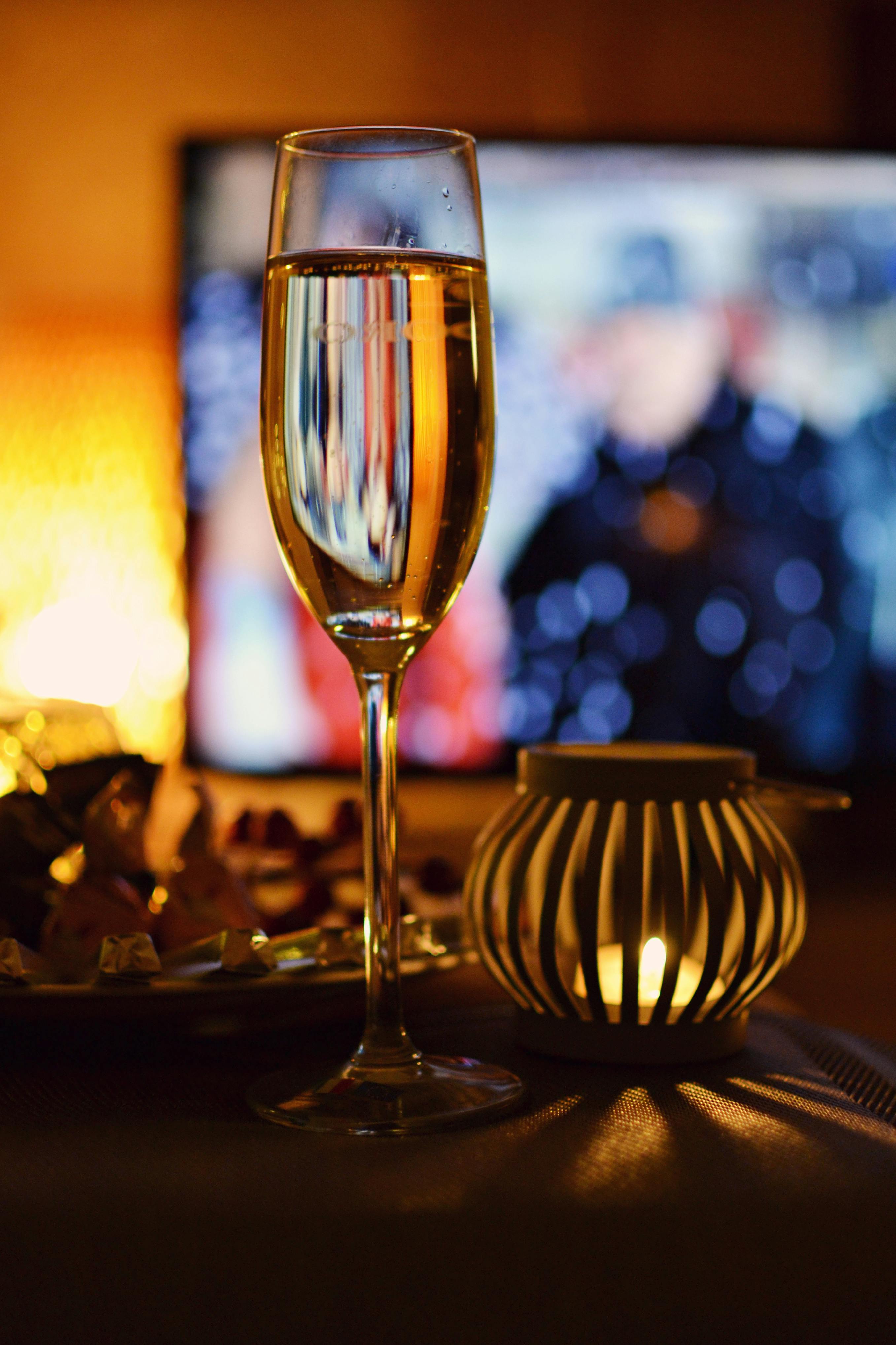 Wine Glass Beside Android Smartphone and Sunglasses · Free Stock Photo