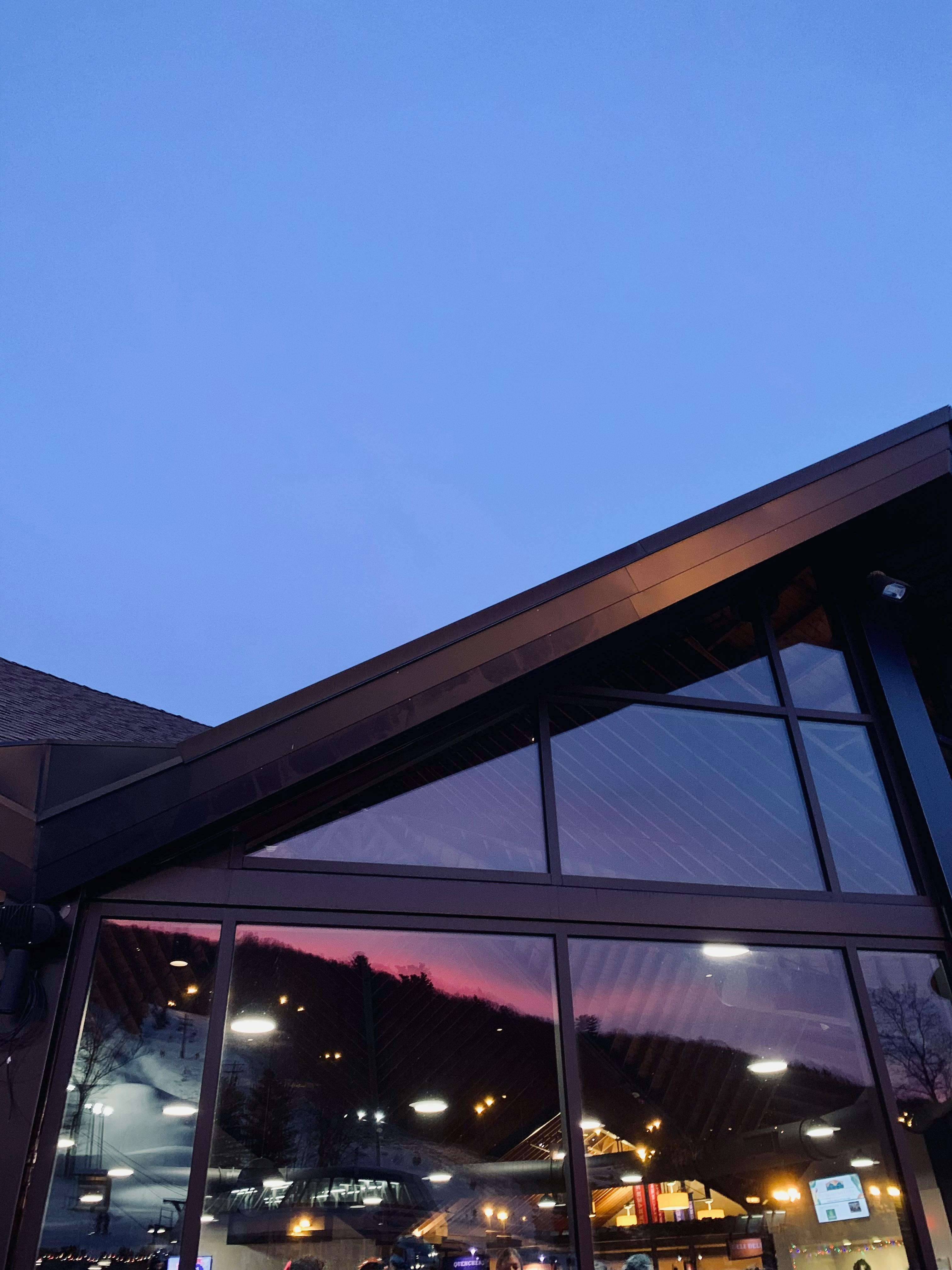 Building with Bars on Windows and Entrance · Free Stock Photo