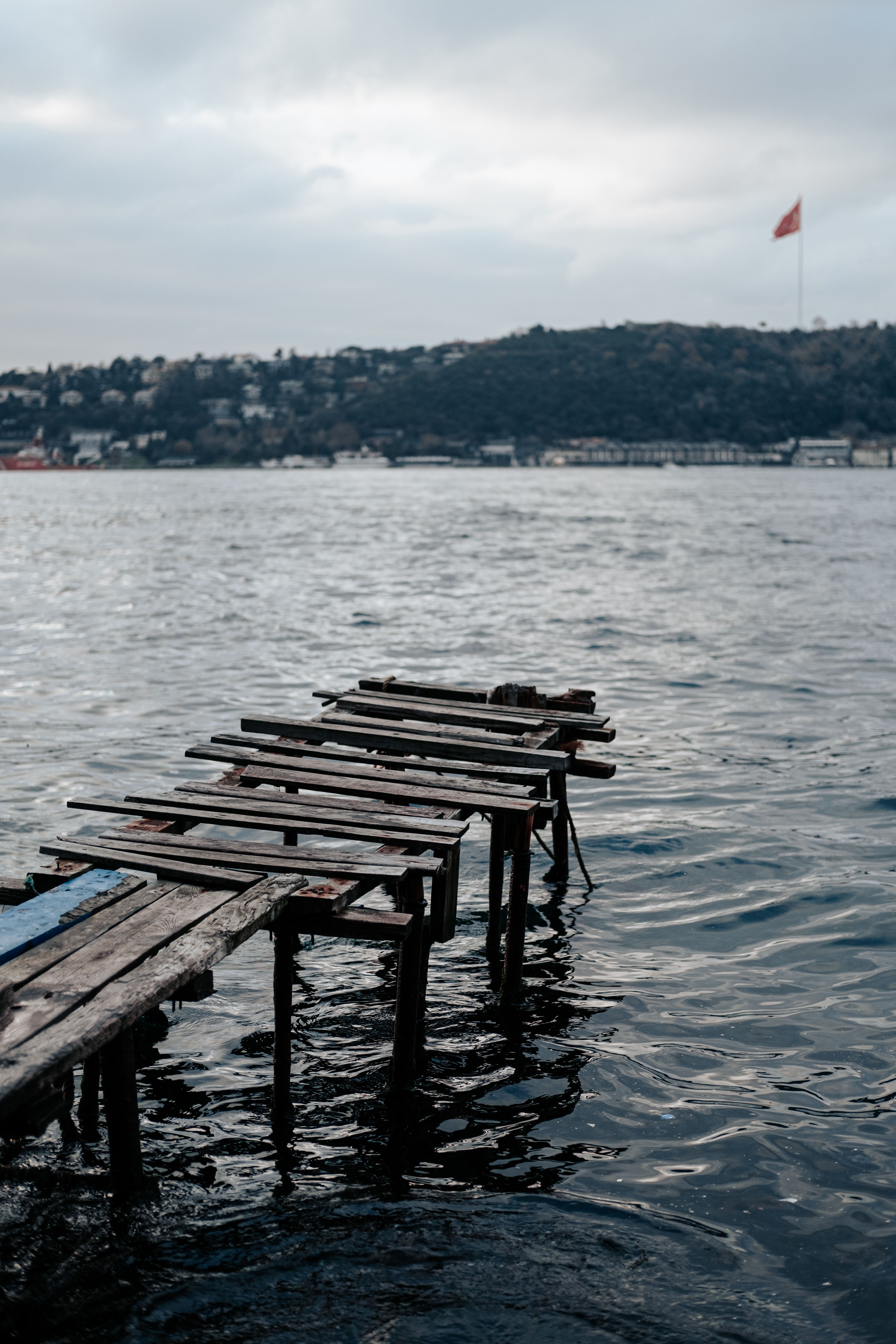 Broken Pier on Lakeshore · Free Stock Photo