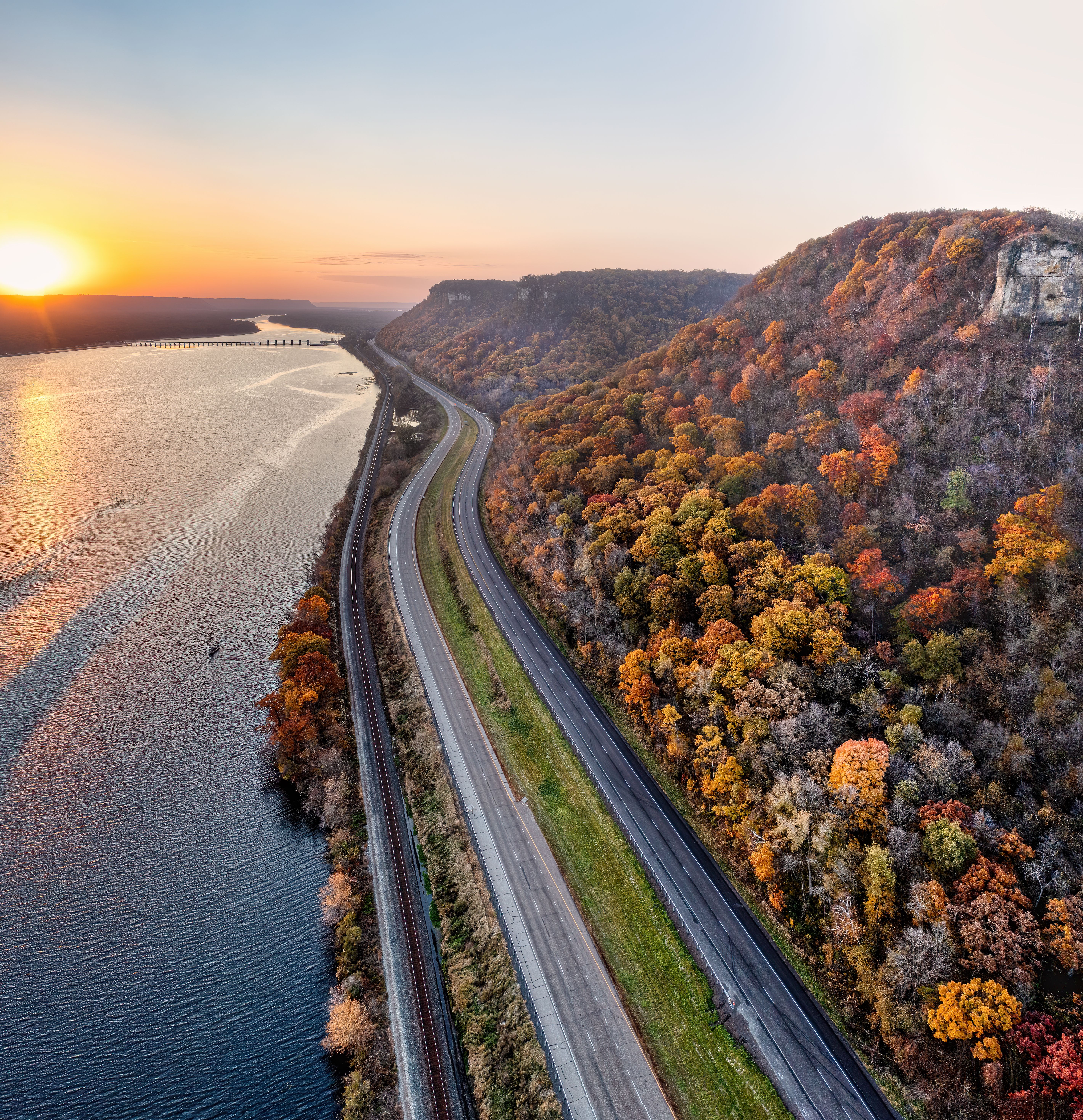 Aerial View of Shoreline During Sunset · Free Stock Photo