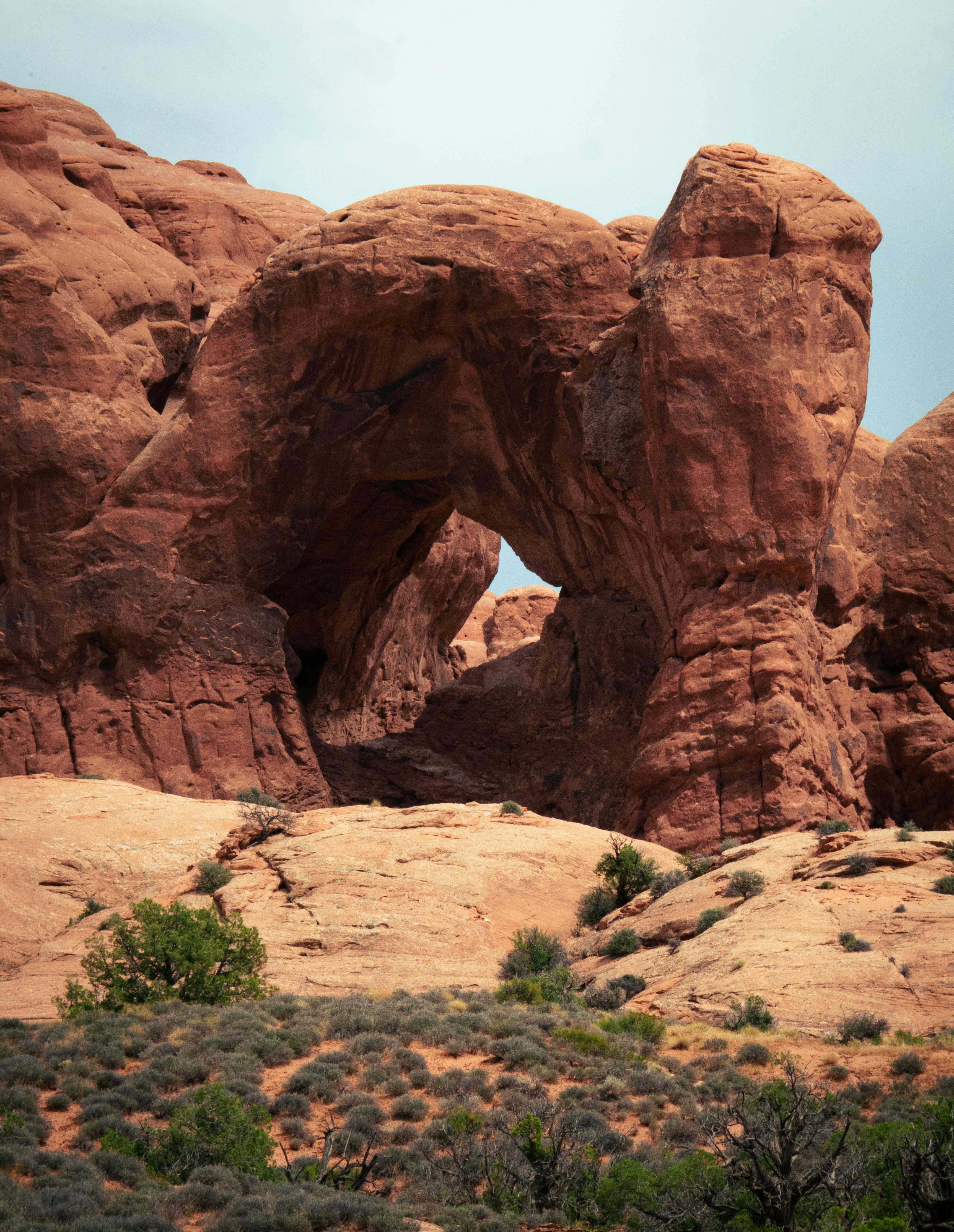 Arch Rock Formation in Desert · Free Stock Photo