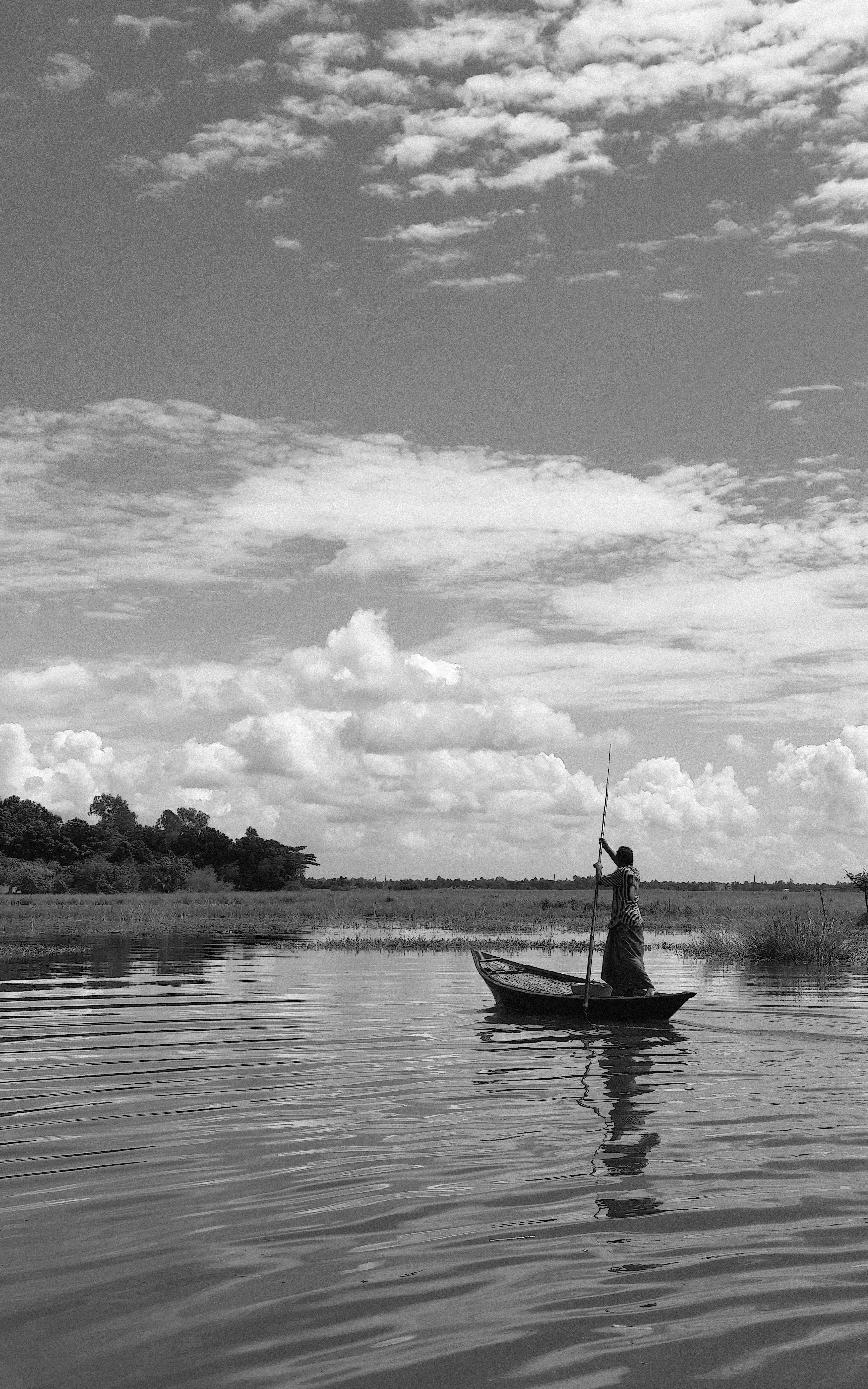 A Person Riding Boat on the River · Free Stock Photo
