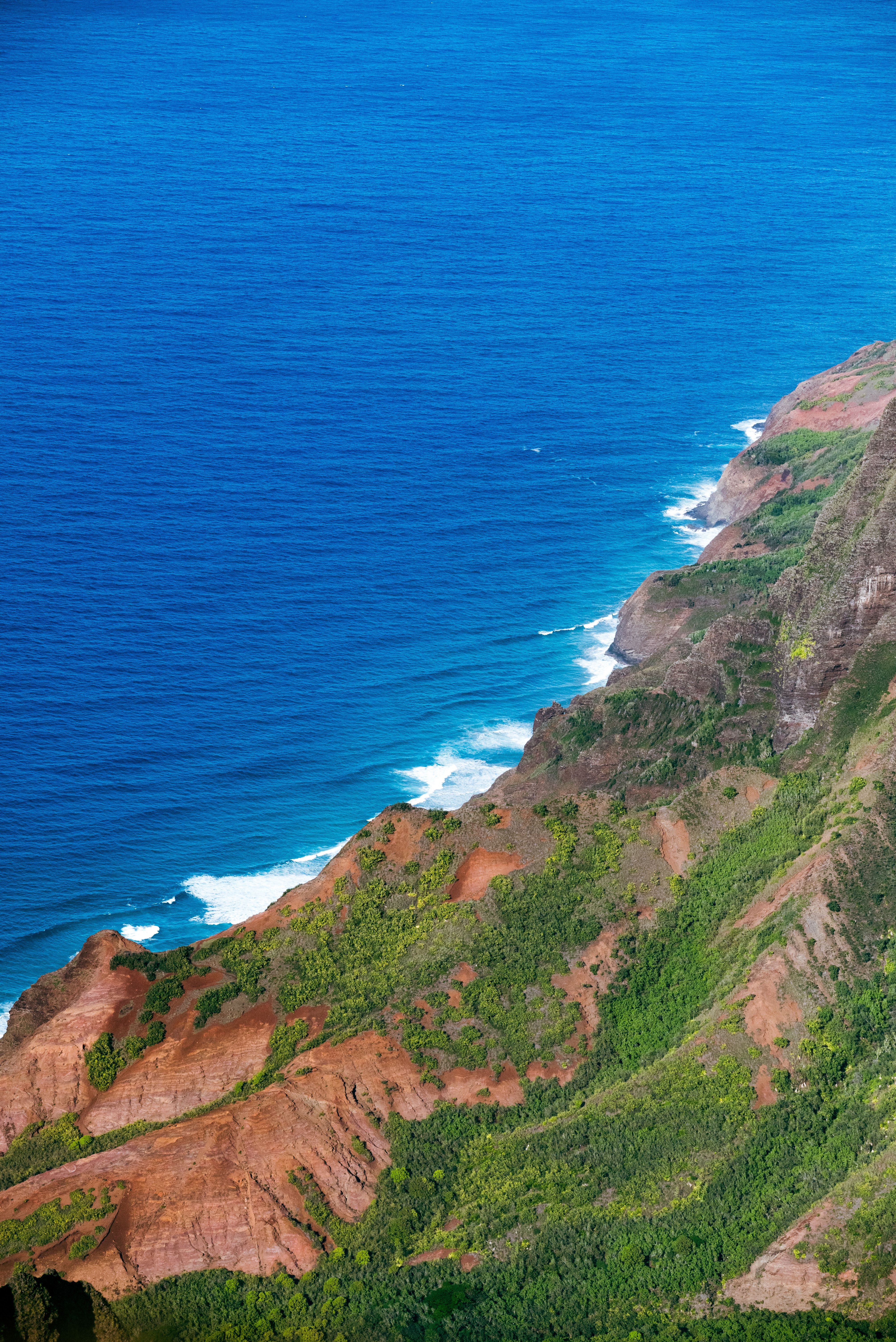 Mountains Falling into the Blue Sea · Free Stock Photo
