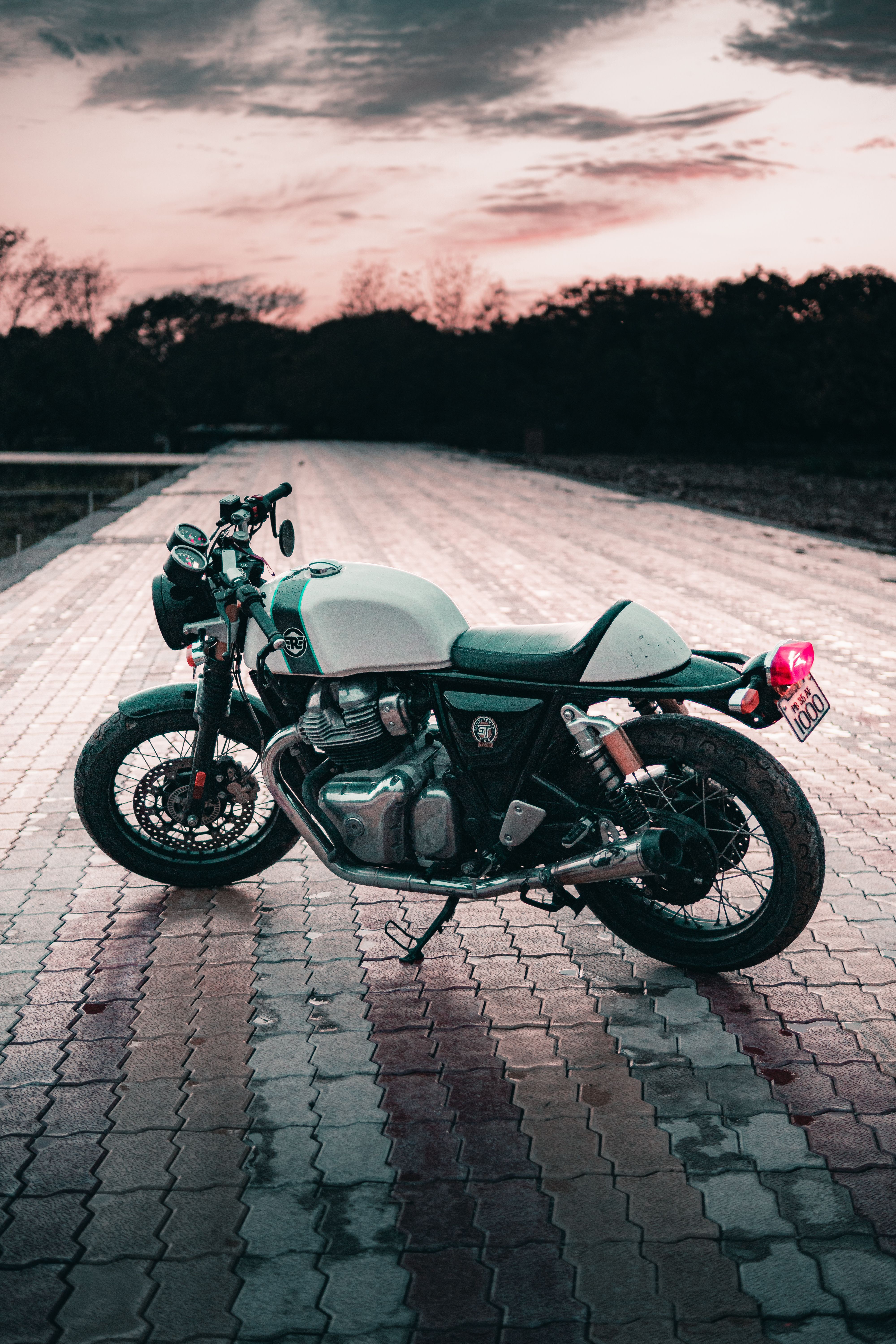 A Motorcycle at Sunset · Free Stock Photo