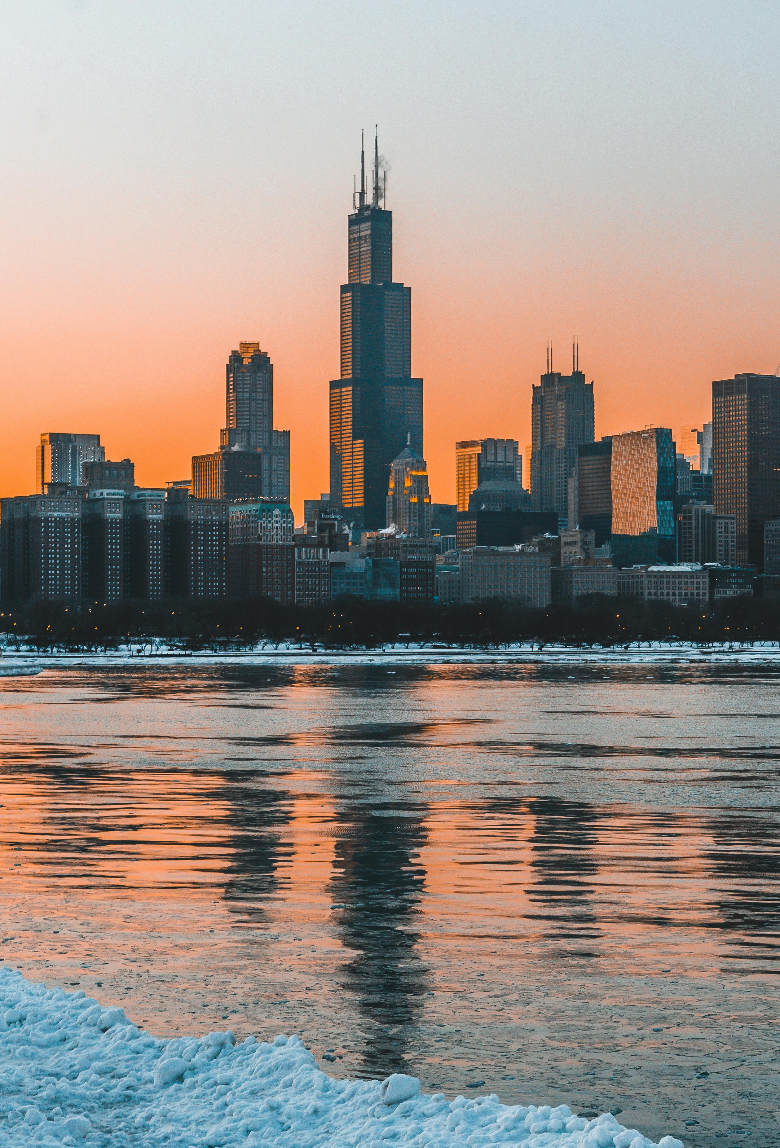 Body Of Water Near High-rise Buildings · Free Stock Photo