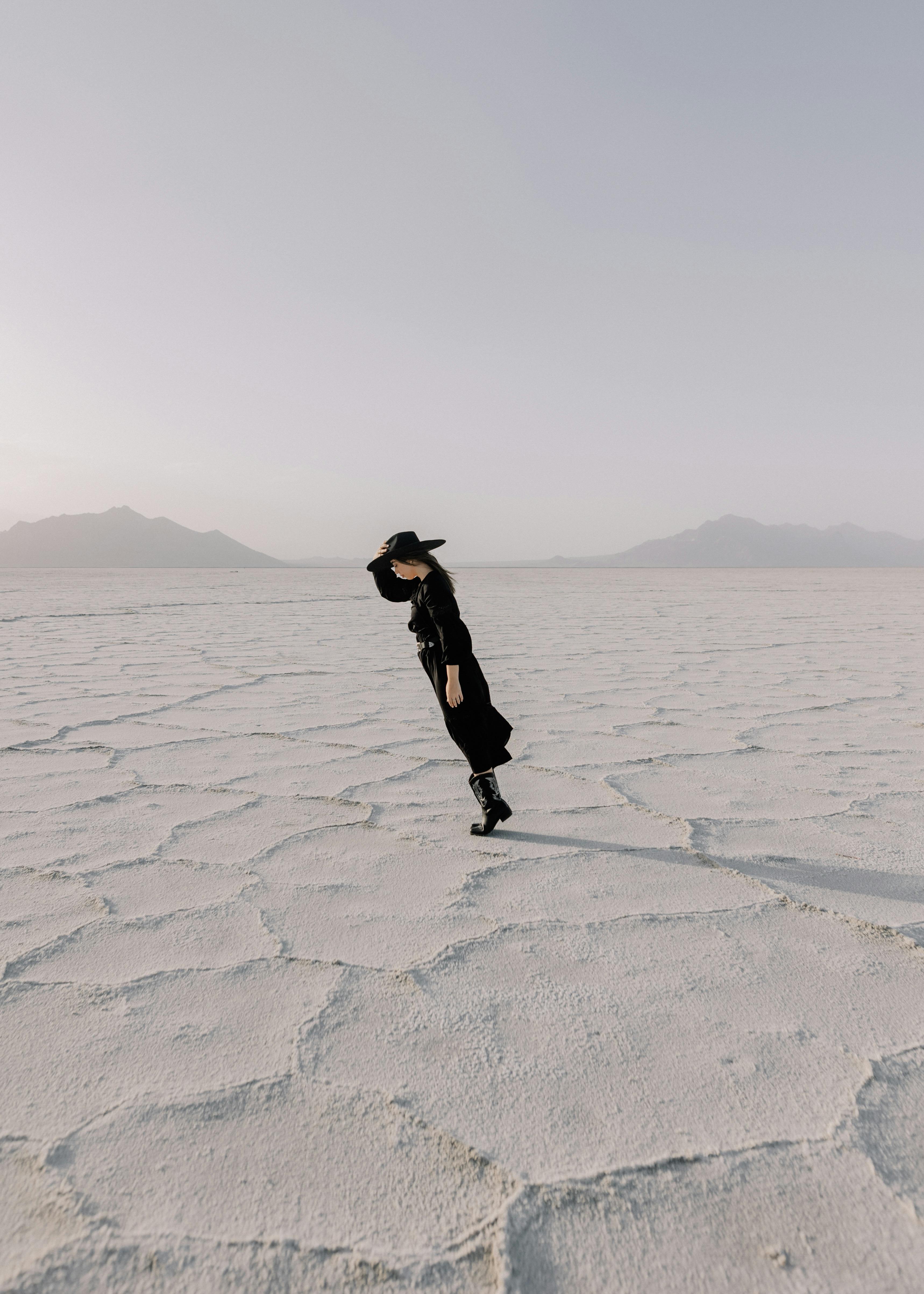 Woman in Black Posing in Salt Flats Utah, USA · Free Stock Photo