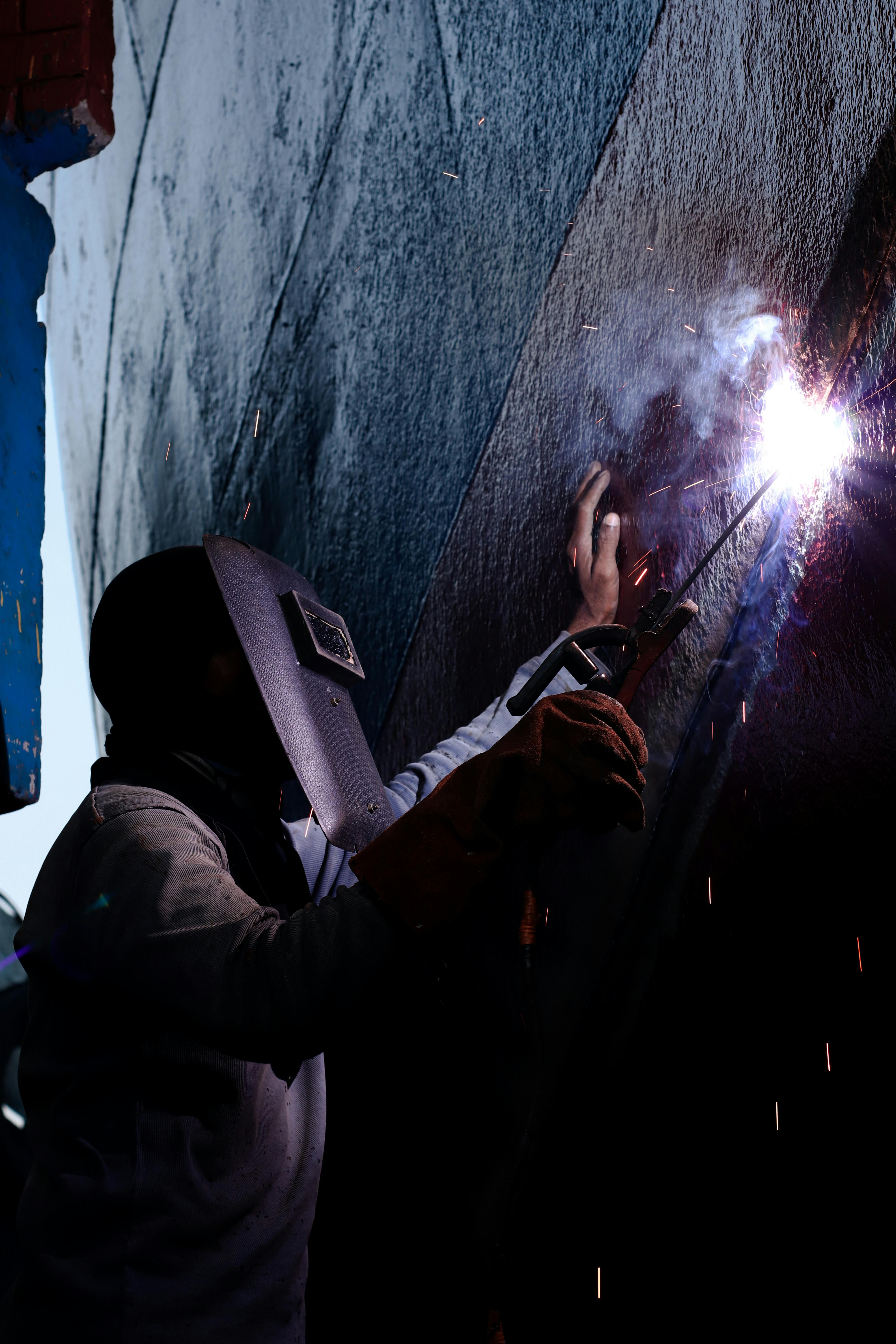 A Man Doing Welding · Free Stock Photo