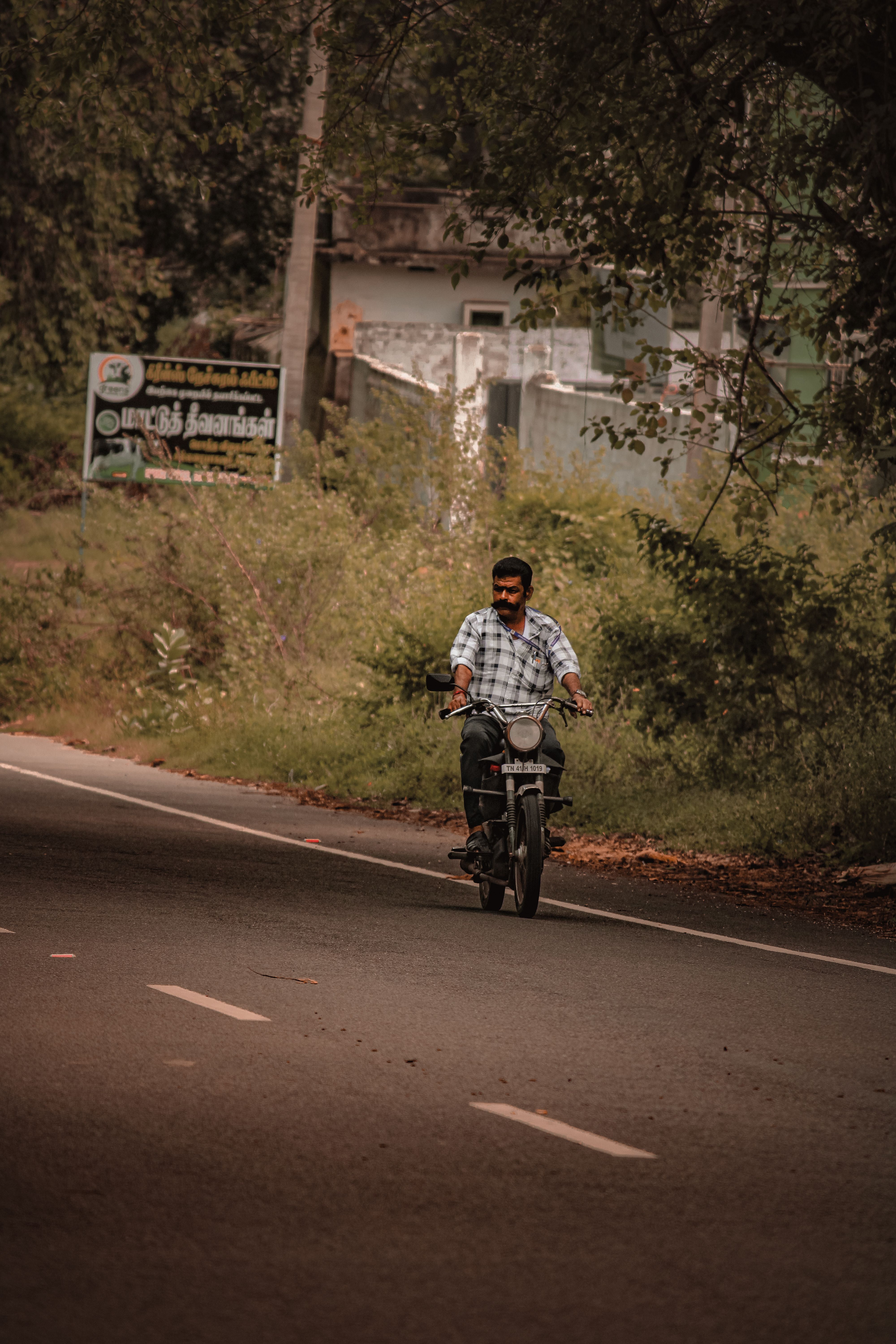 Man Riding on Small Motorcycle · Free Stock Photo