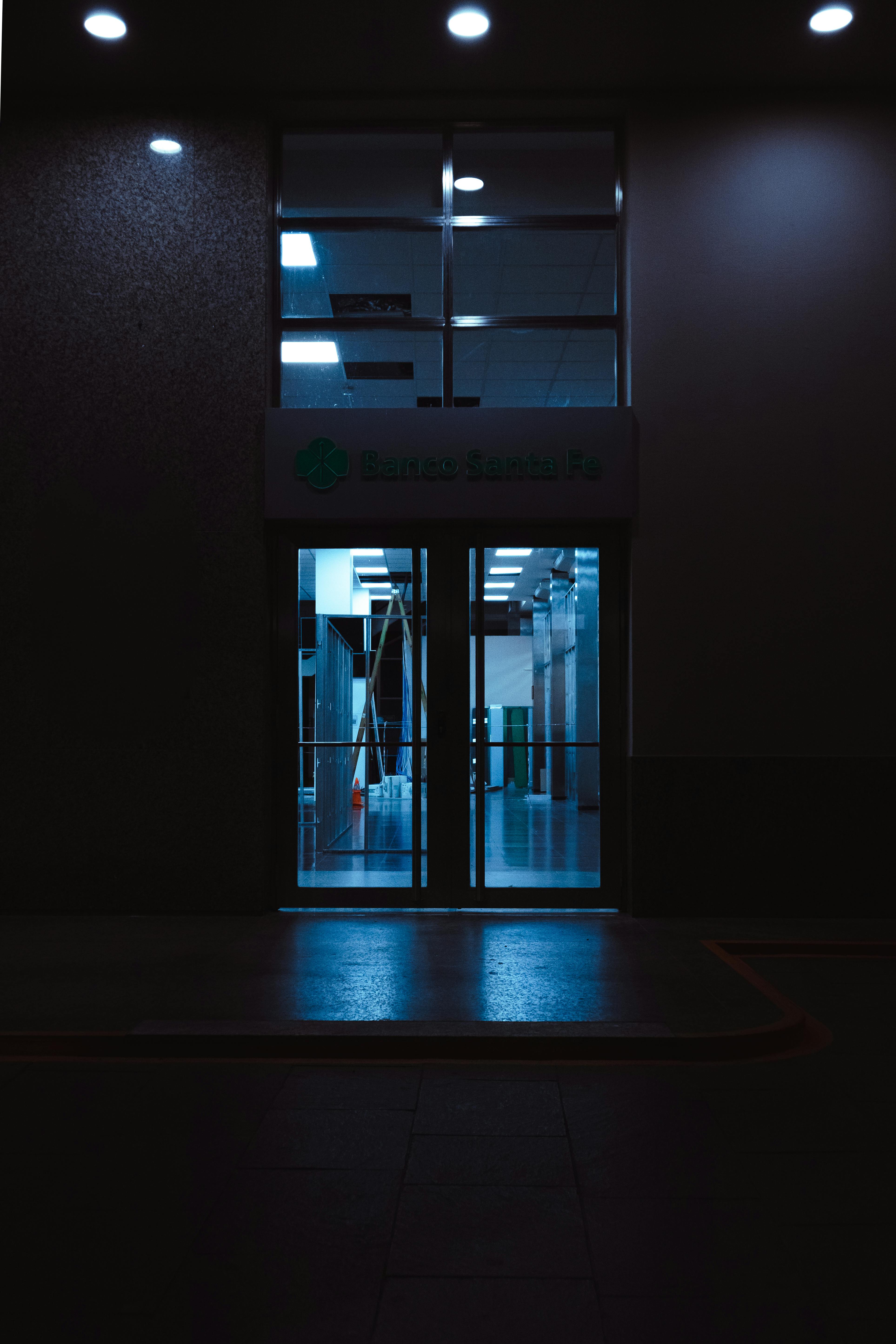 Doors to Building with Blue Light Inside · Free Stock Photo