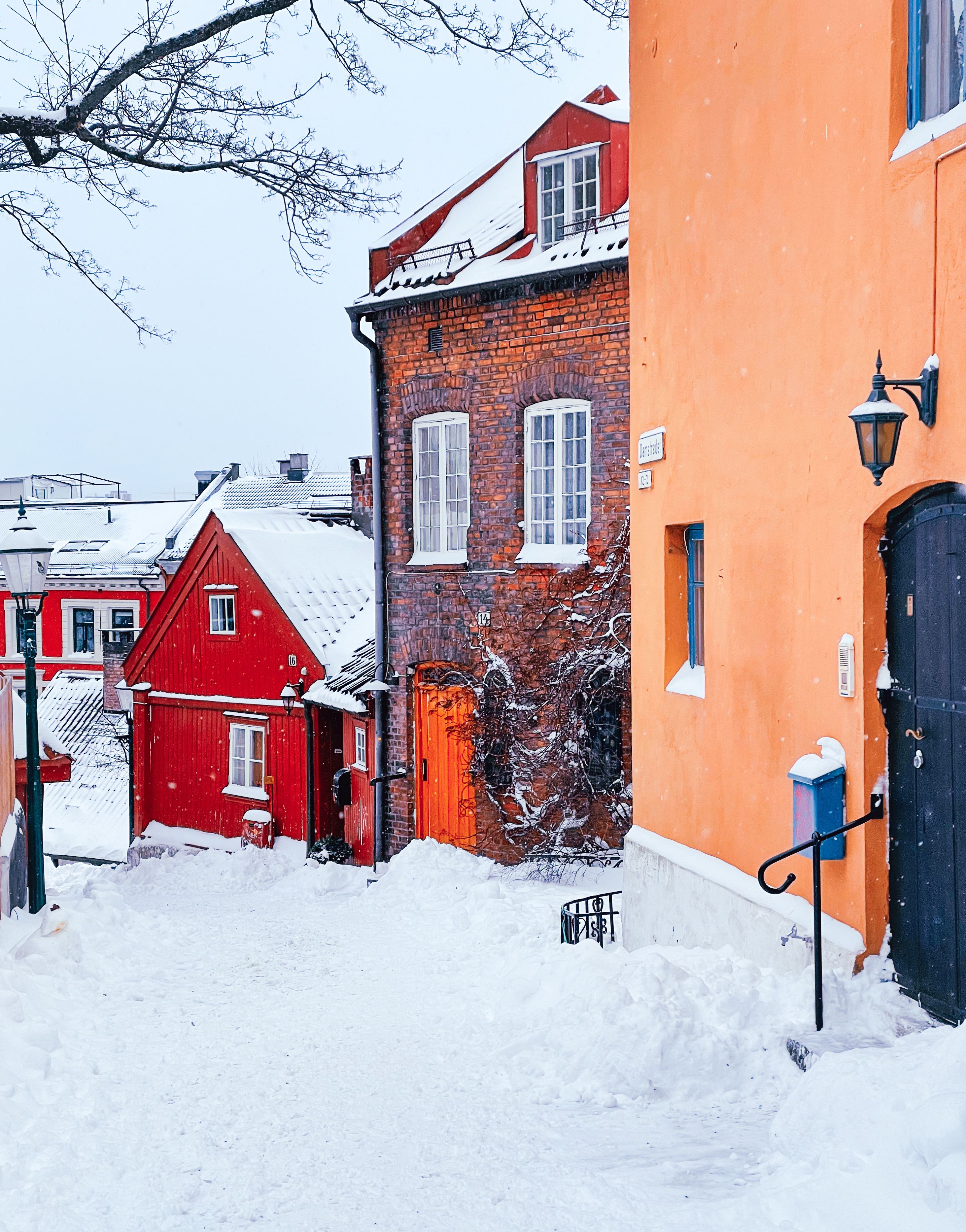Snow on Alley near Buildings · Free Stock Photo