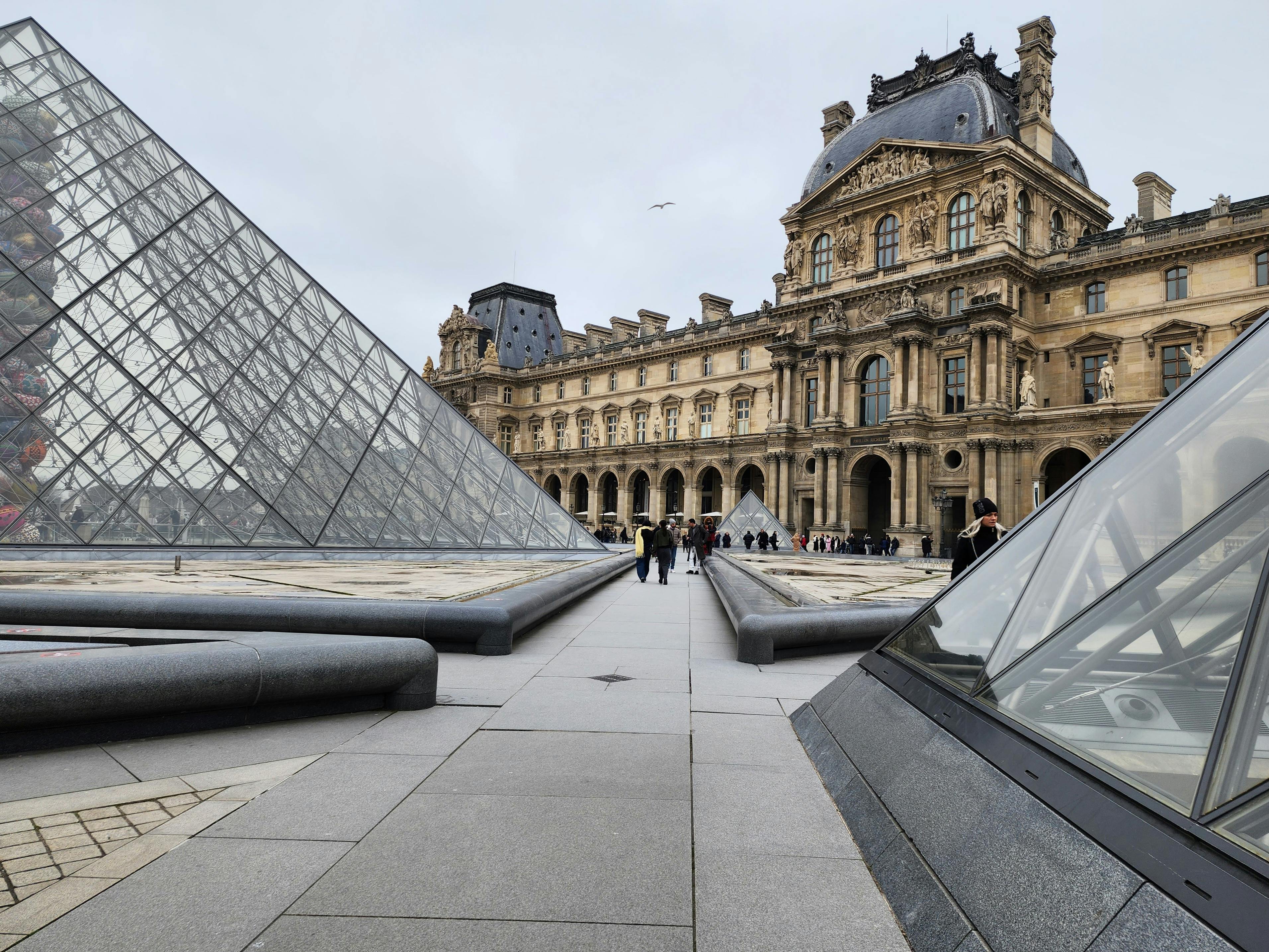 Exterior of the Louvre Palace and Pyramids in Paris, France · Free ...