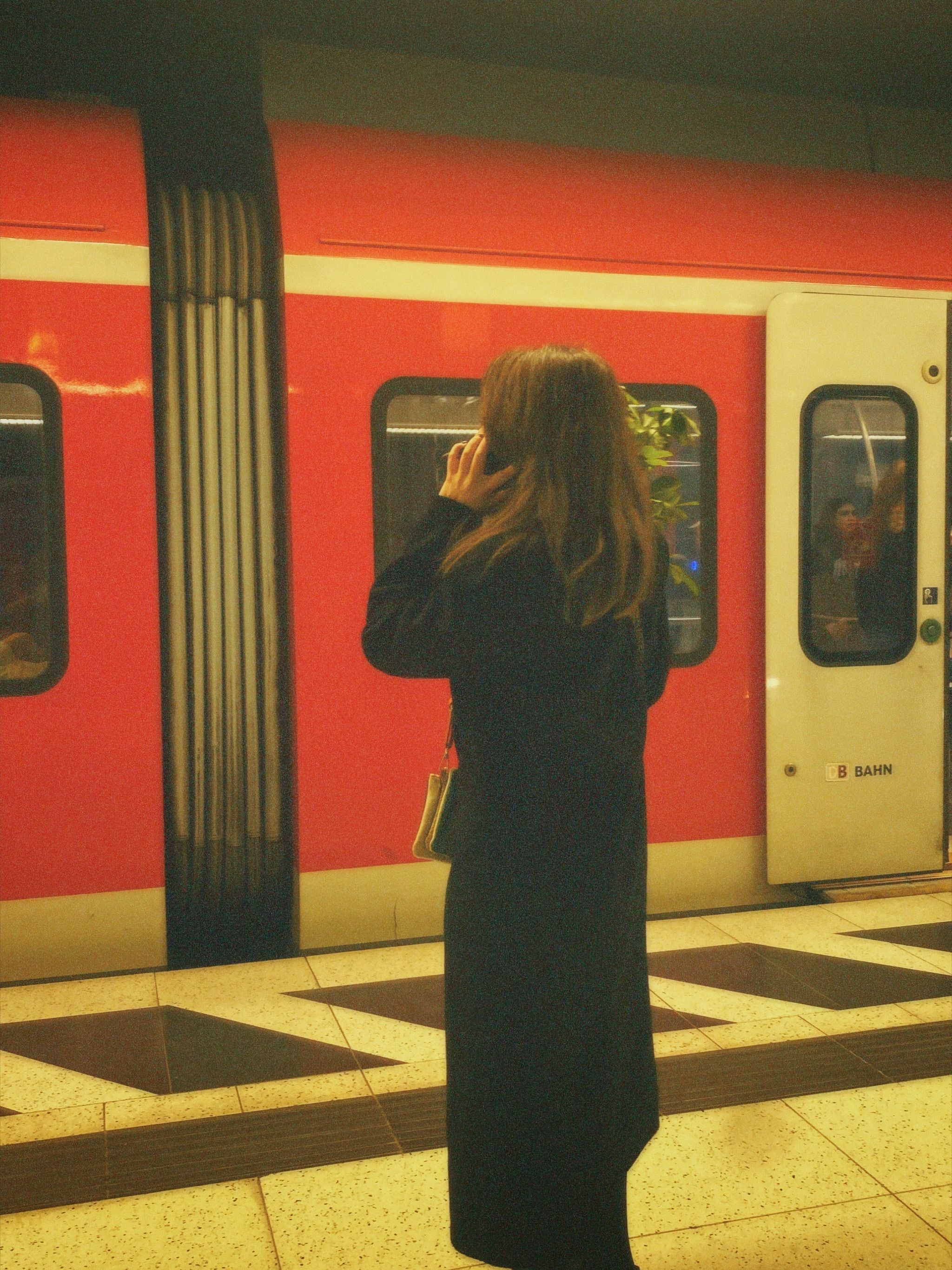 Woman at the Train Station · Free Stock Photo