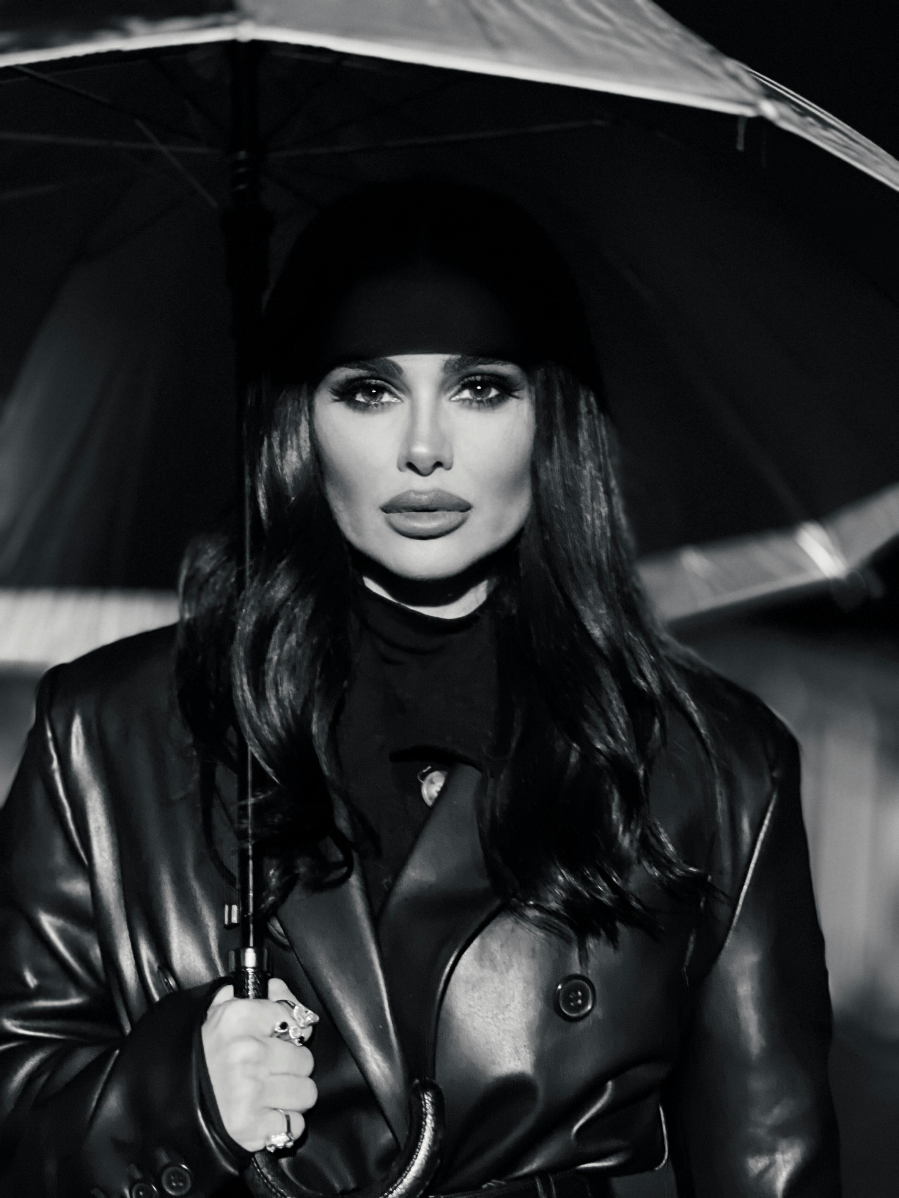 Black and White Portrait of a Model under an Umbrella · Free Stock Photo