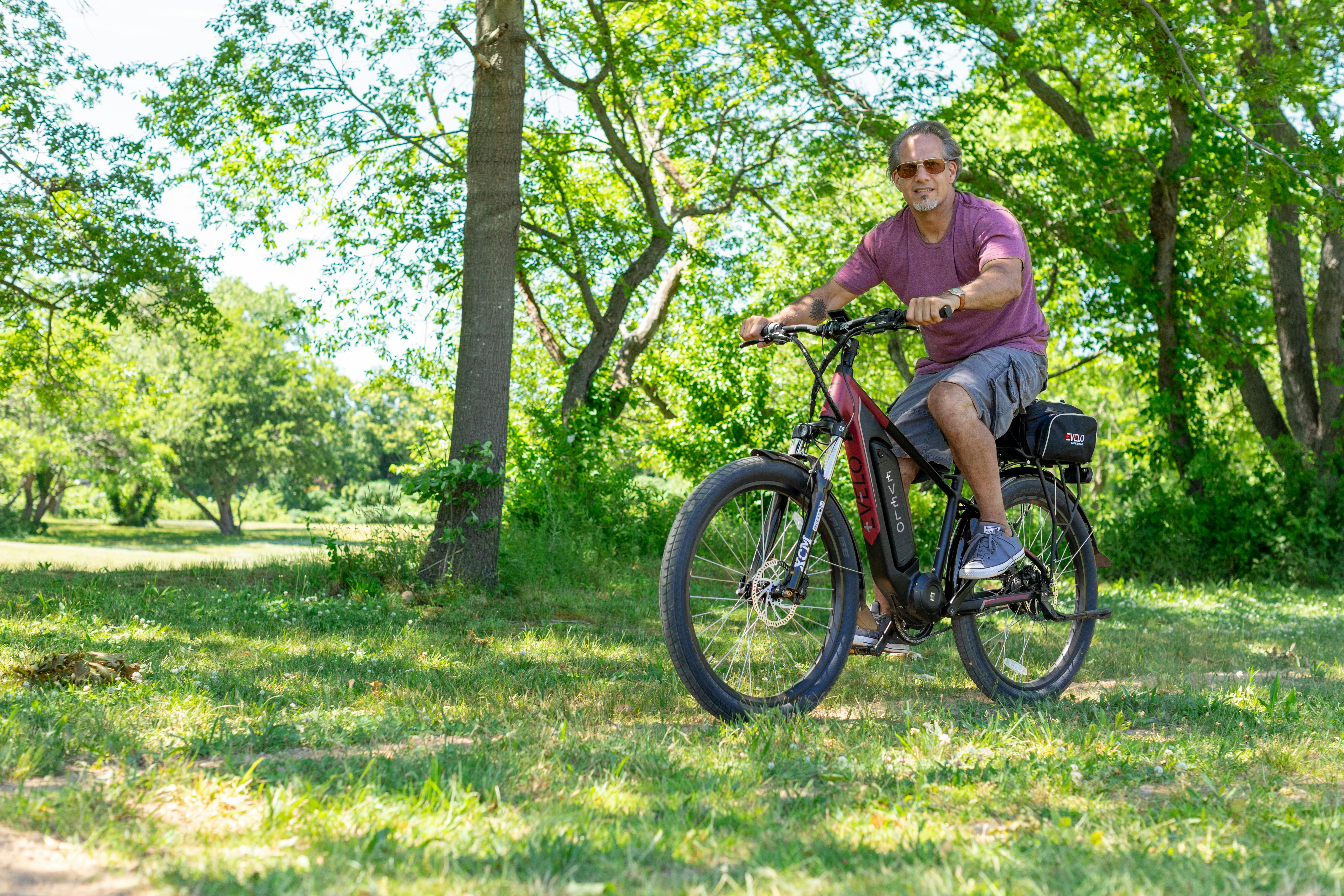 Group of People Riding a Bicycle · Free Stock Photo