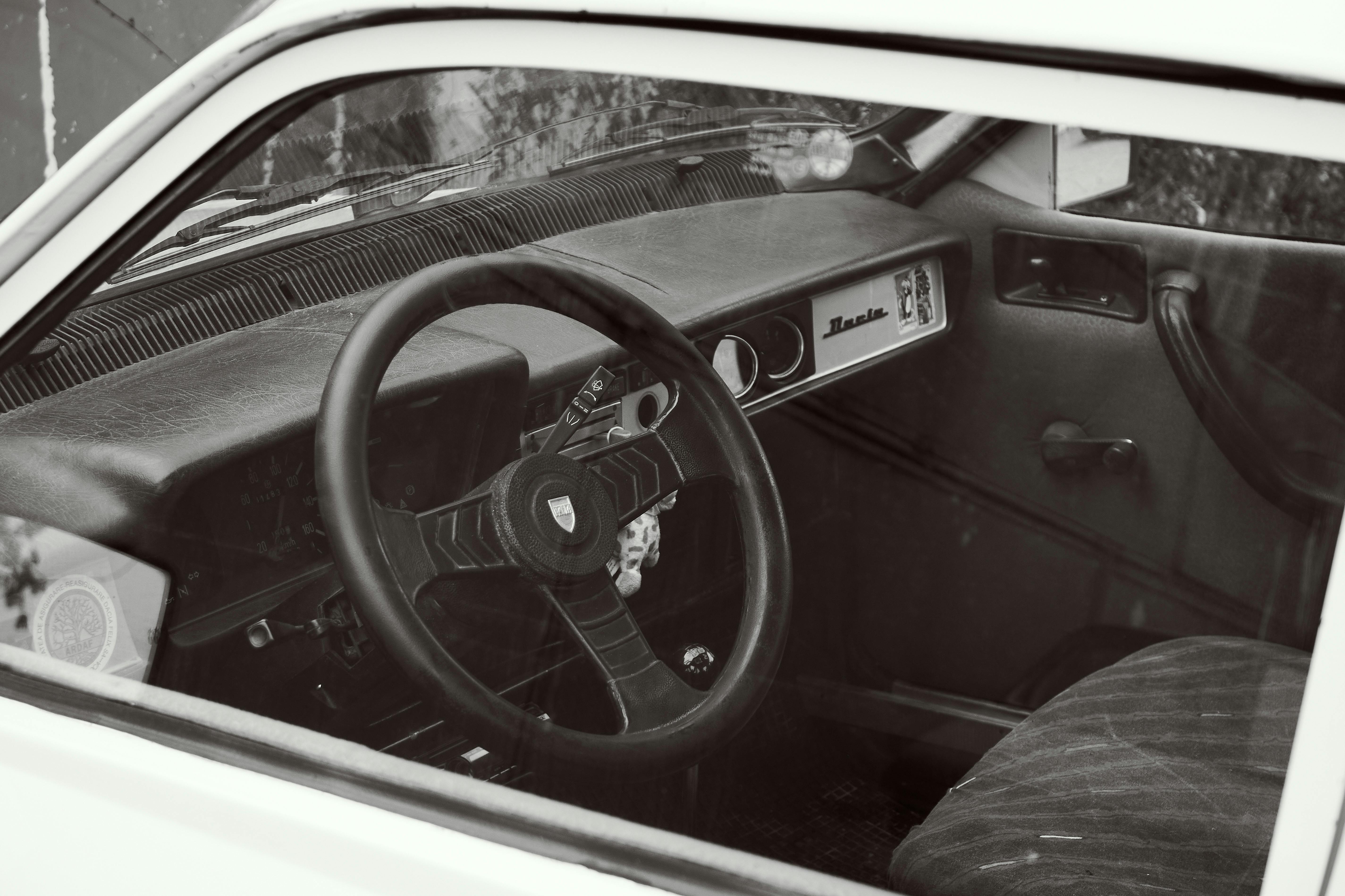 Car with a Small Steering Wheel · Free Stock Photo