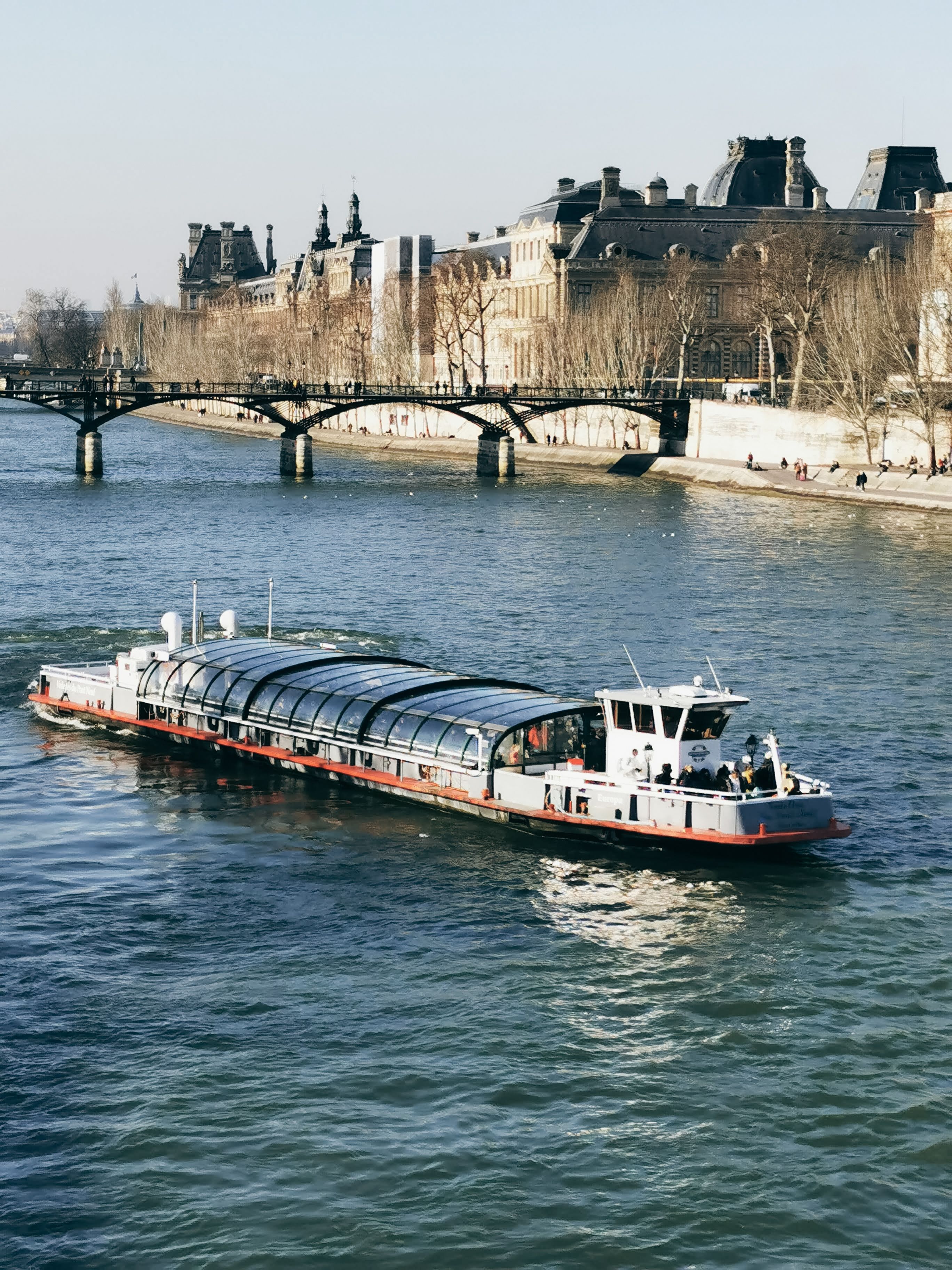 Barge on River in Town · Free Stock Photo
