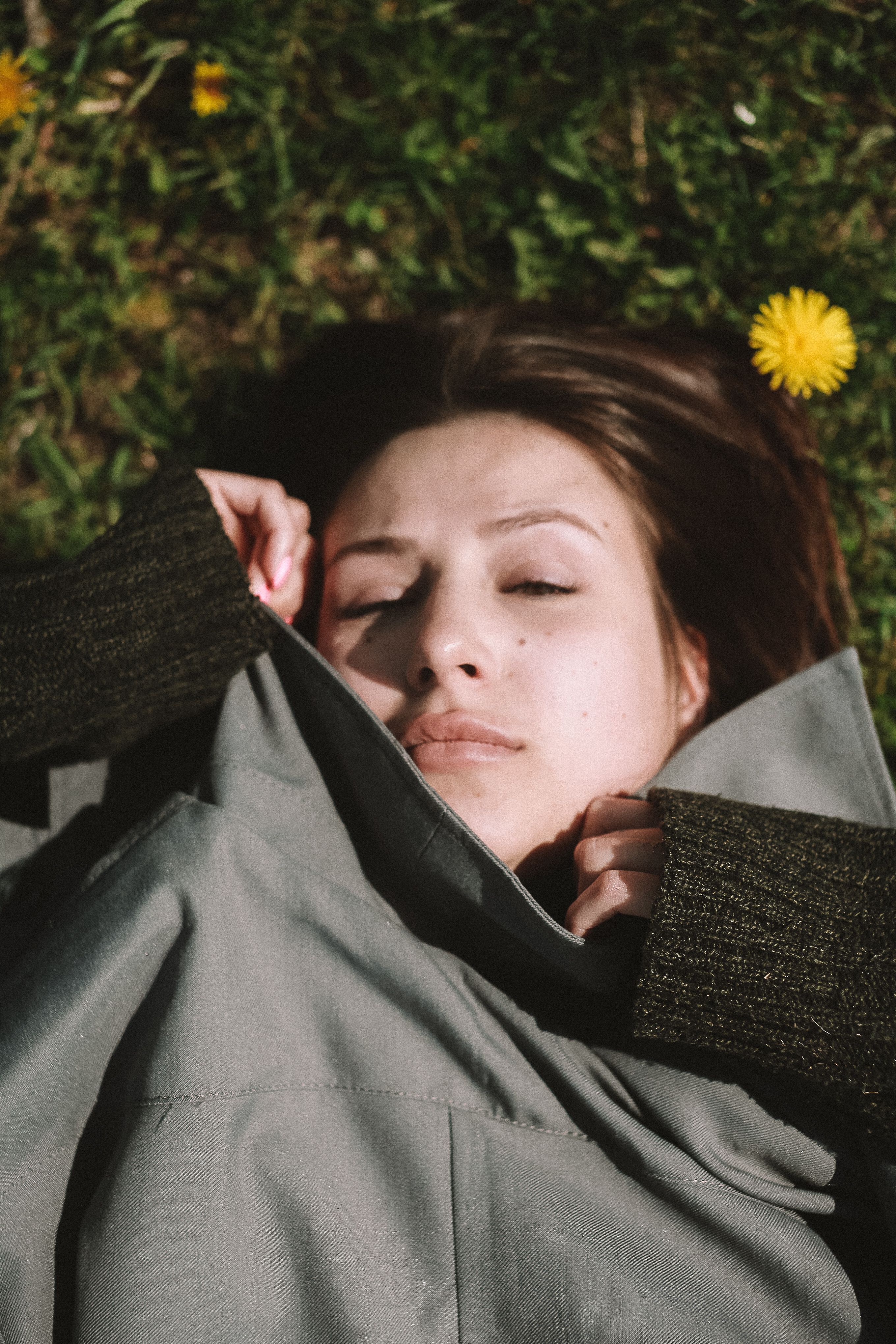 A Woman Lying Down in the Forest · Free Stock Photo